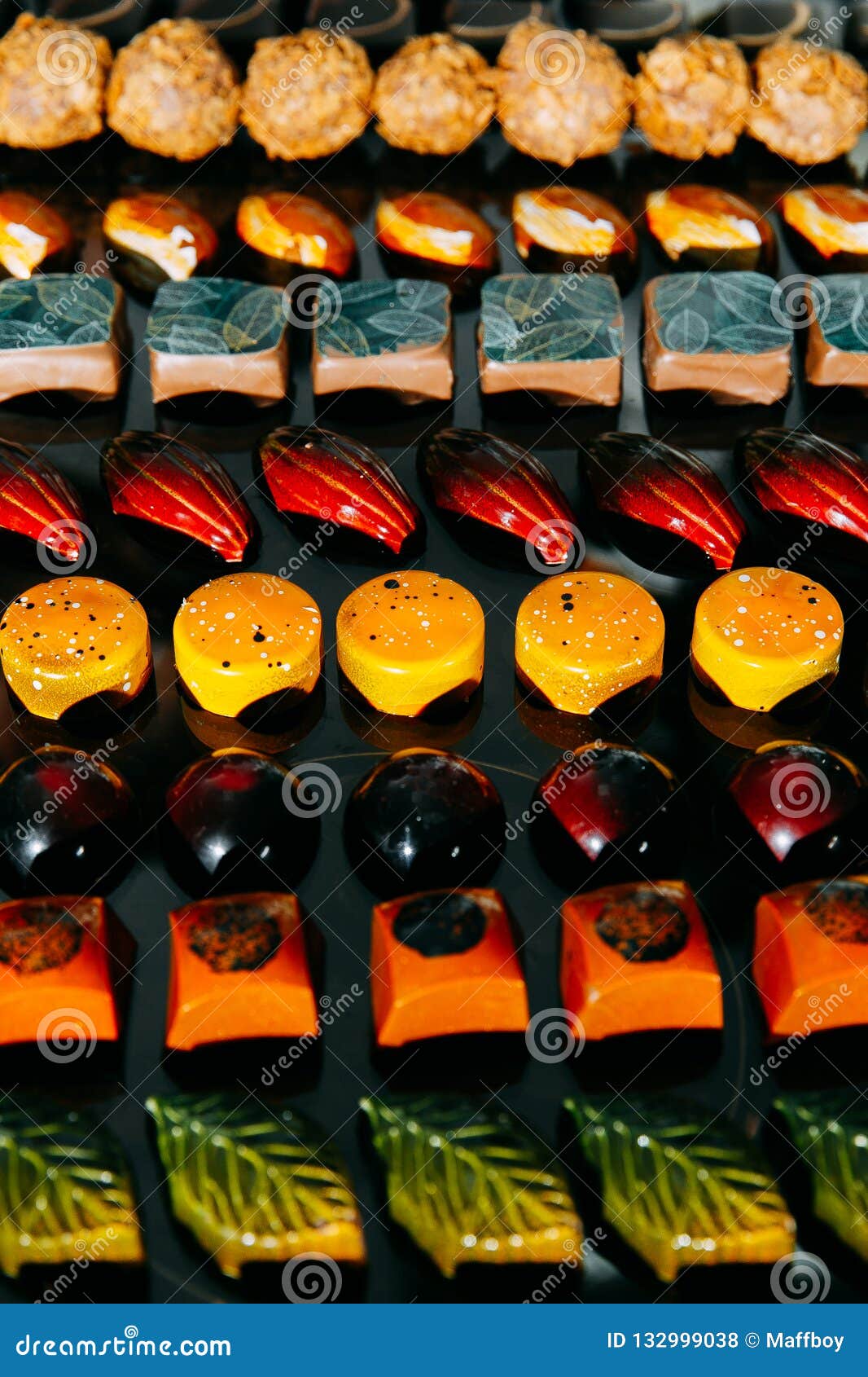 Large Choice of Handmade Chocolates in Rows Stock Photo - Image of ...