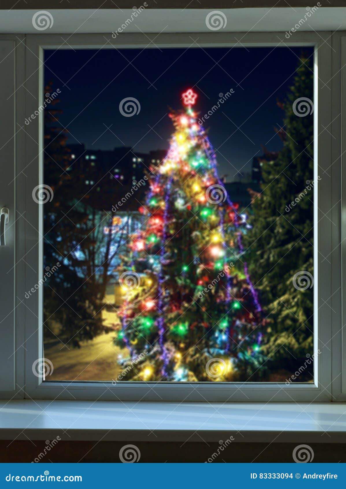 A Large Christmas Tree Outside the Window Stock Photo - Image of ...