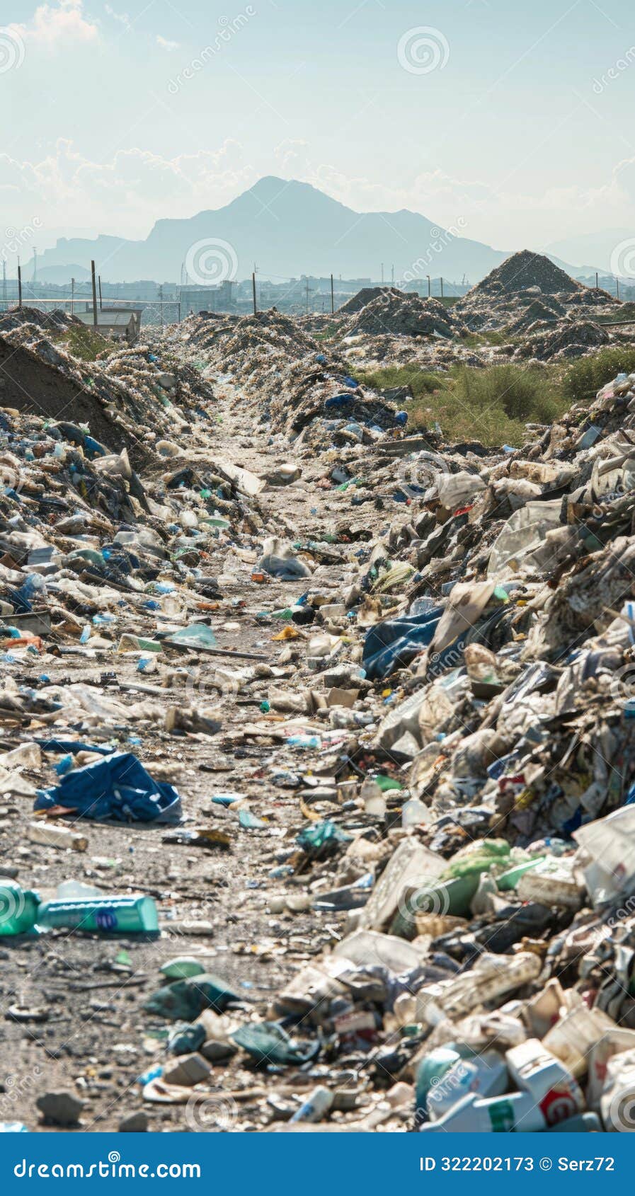 In a Large City Dump, Towering Heaps of Garbage Illustrate the Volume ...