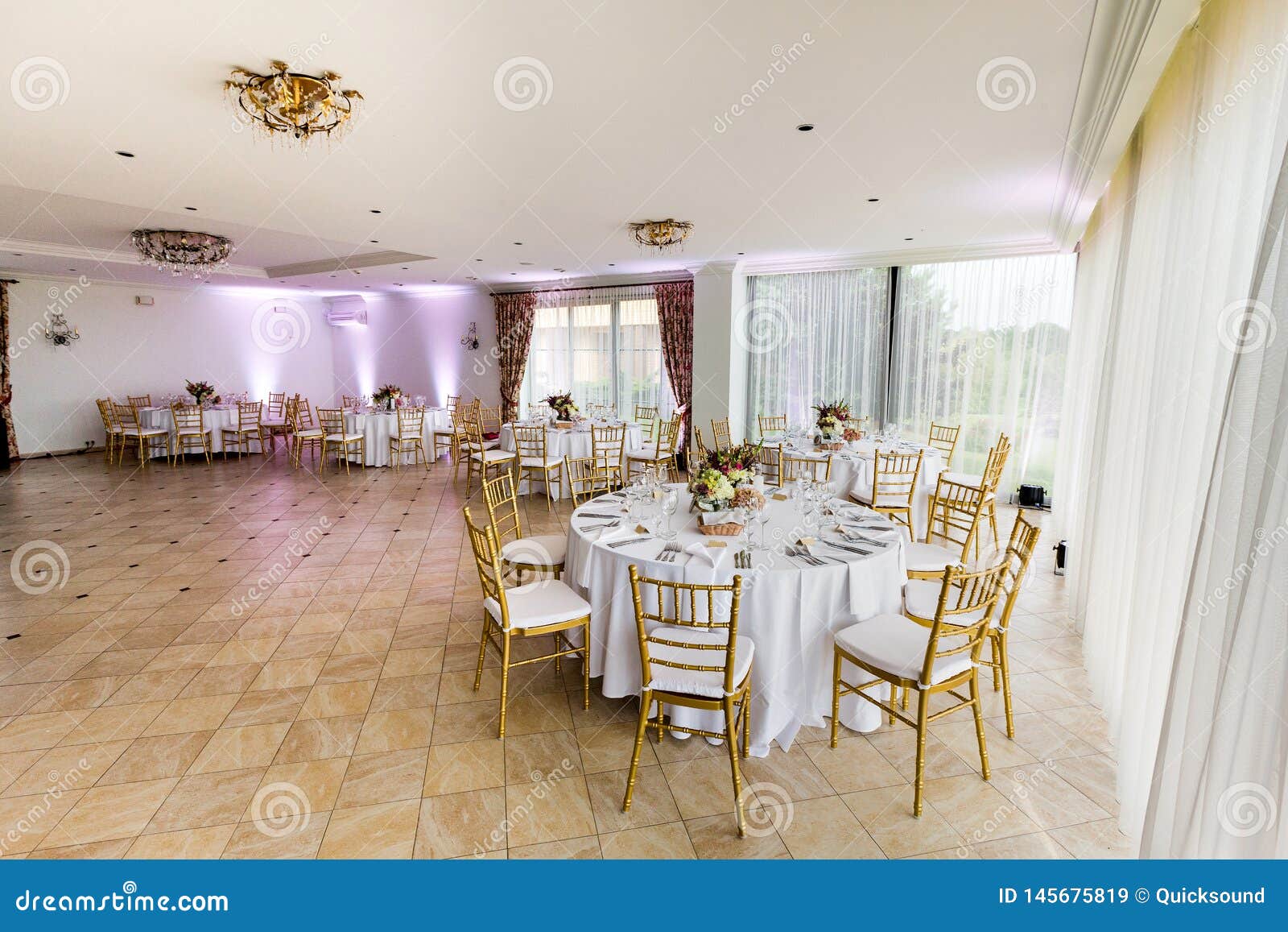 Large classic wedding hall stock image. Image of flowers - 145675819