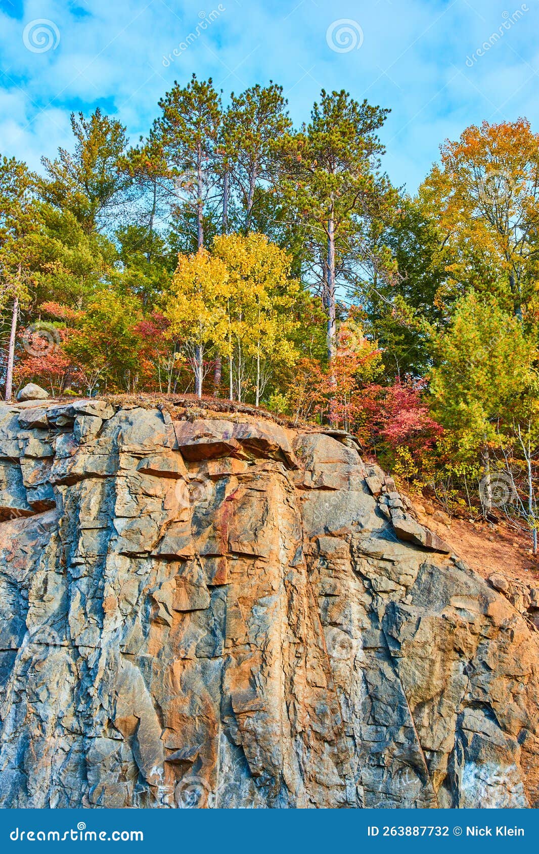 Large Cliff with Colorful Fall Trees Covering Top Stock Photo - Image ...