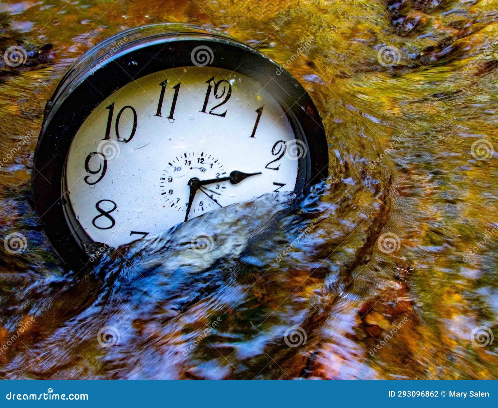 A Large Clock Half Submerged in a Beautiful Flowing Stream Stock Photo ...