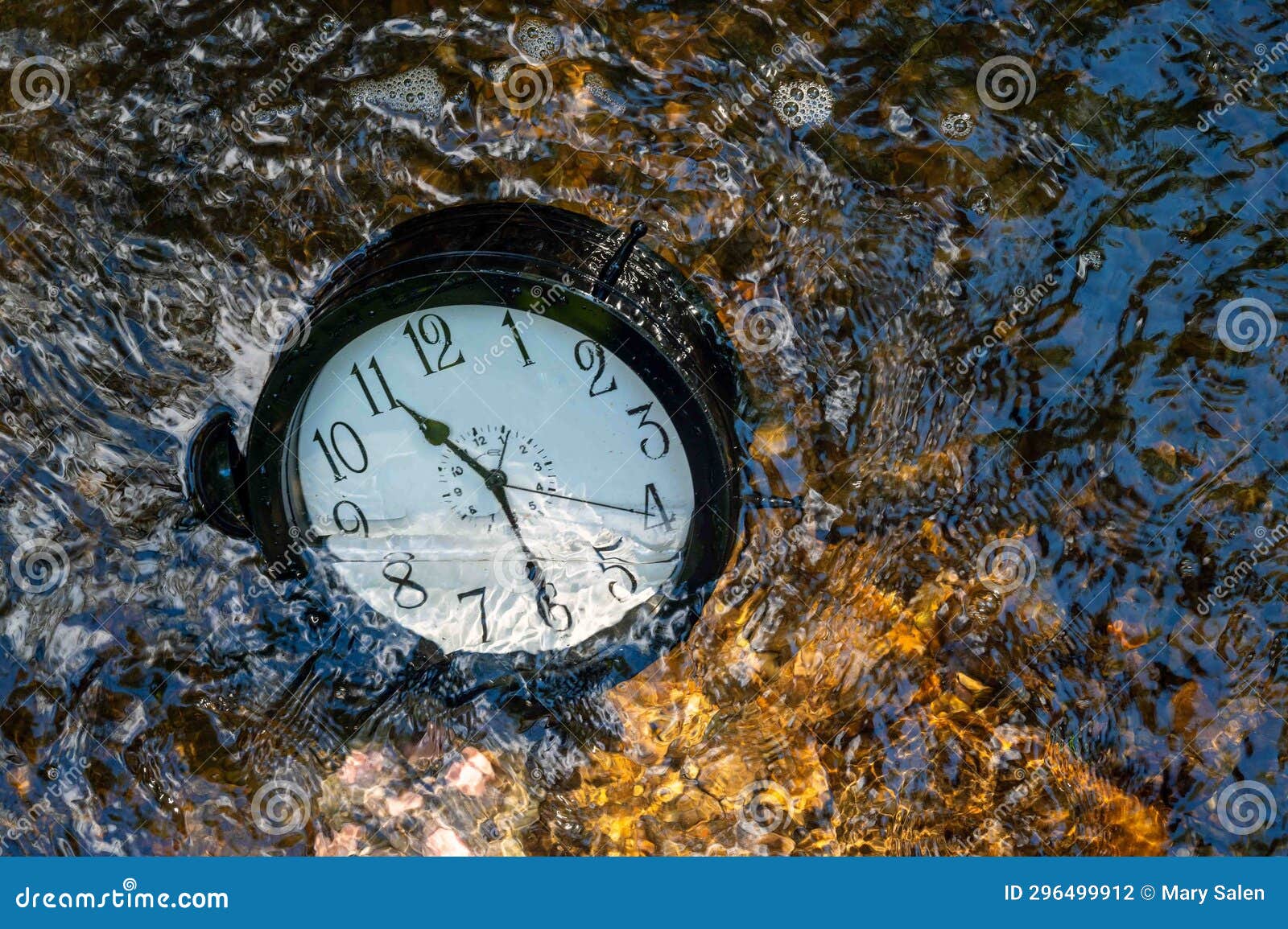 A Large Clock Half Submerged in a Flowing Stream with Ripples Pebbles ...