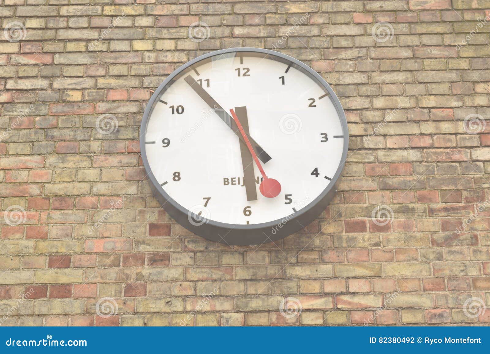 Large Clock Showing Beijing Time Stock Photo - Image of clock, brick ...