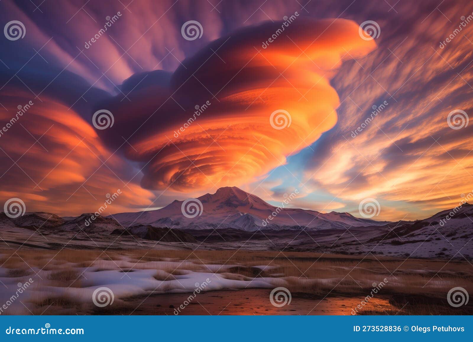 A Large Cloud Formation Over a Mountain in the Distance with a Sunset ...
