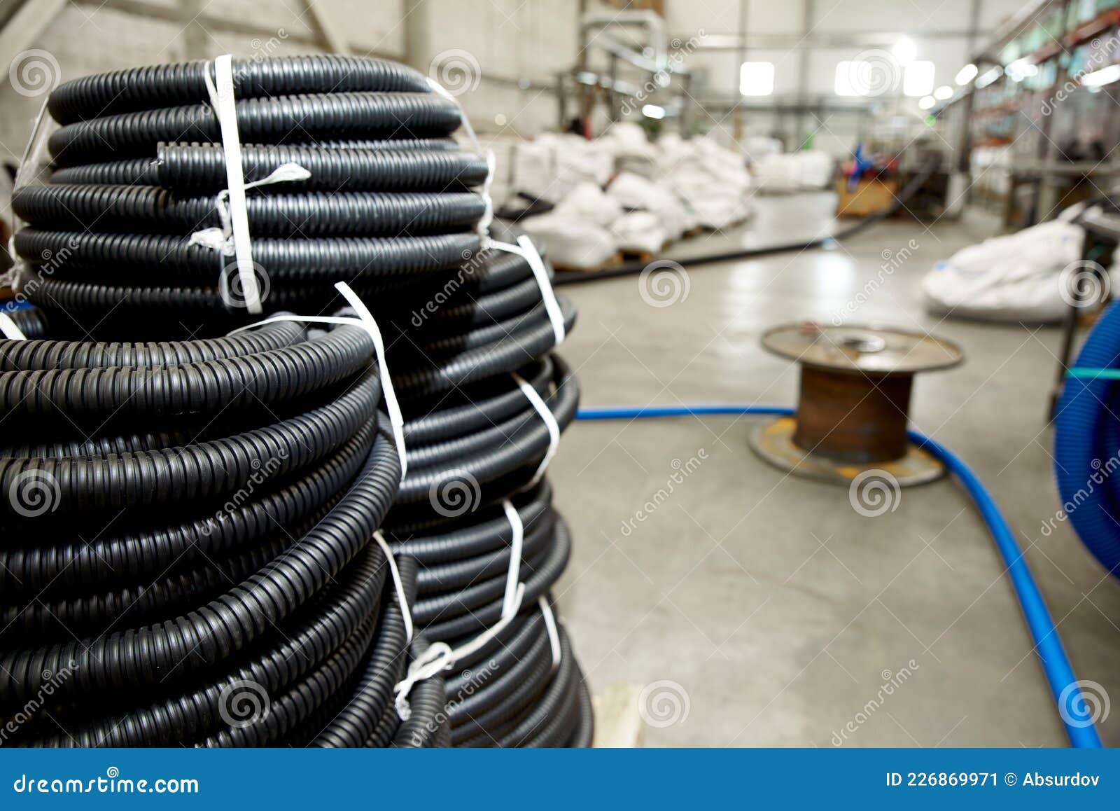 Large Coils of Black Corrugated Pipe at the Factory Stock Image - Image ...
