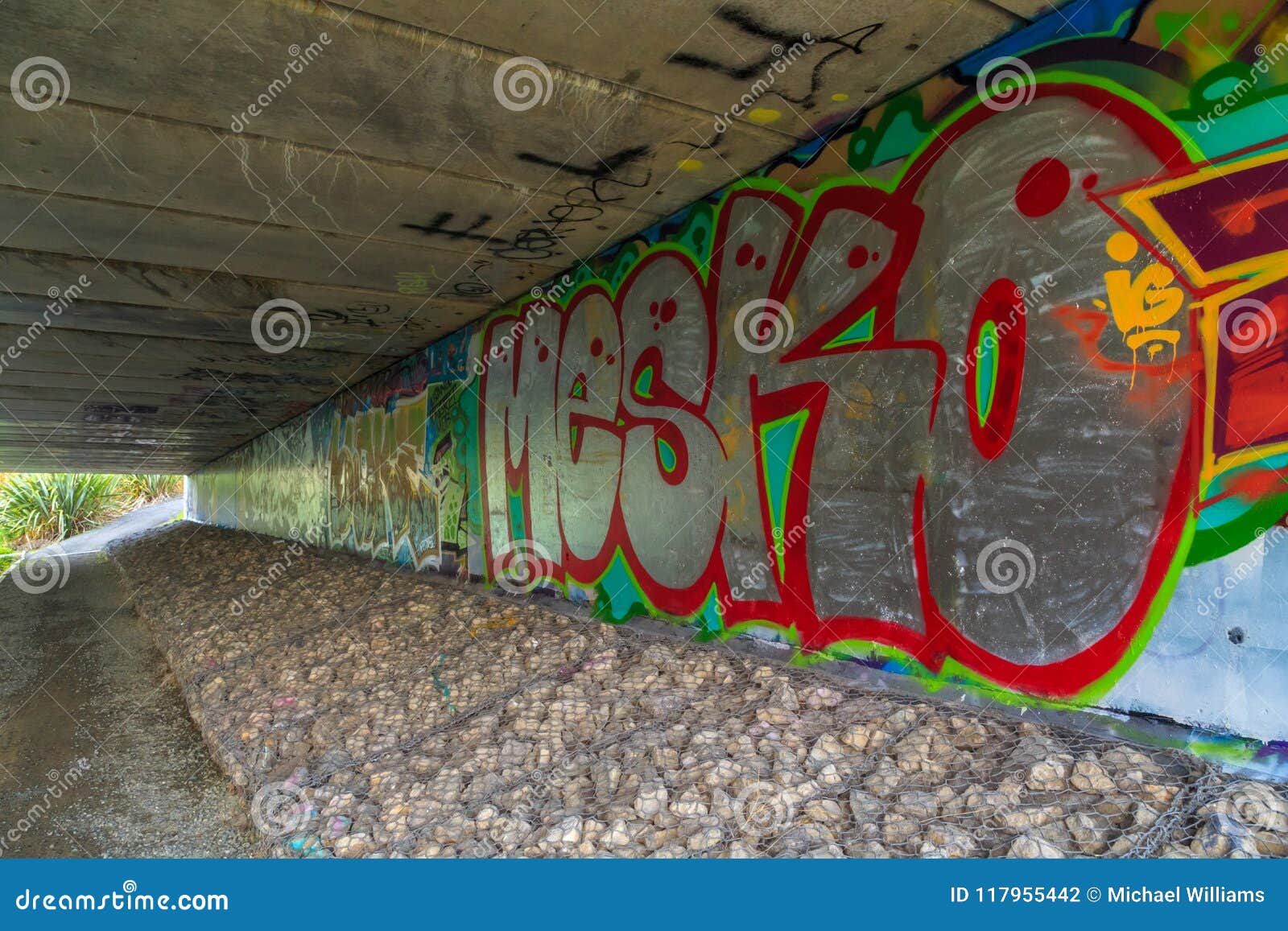 Large Colorful Graffiti Under a Bridge Stock Photo - Image of bold ...