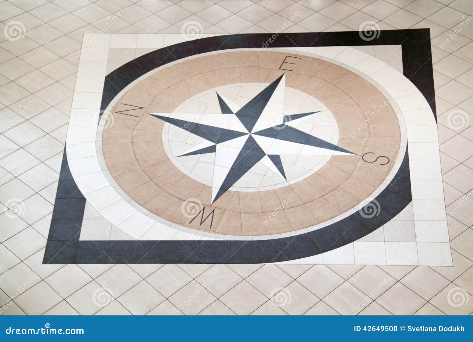 Large compass on floor stock photo. Image of direction - 42649500
