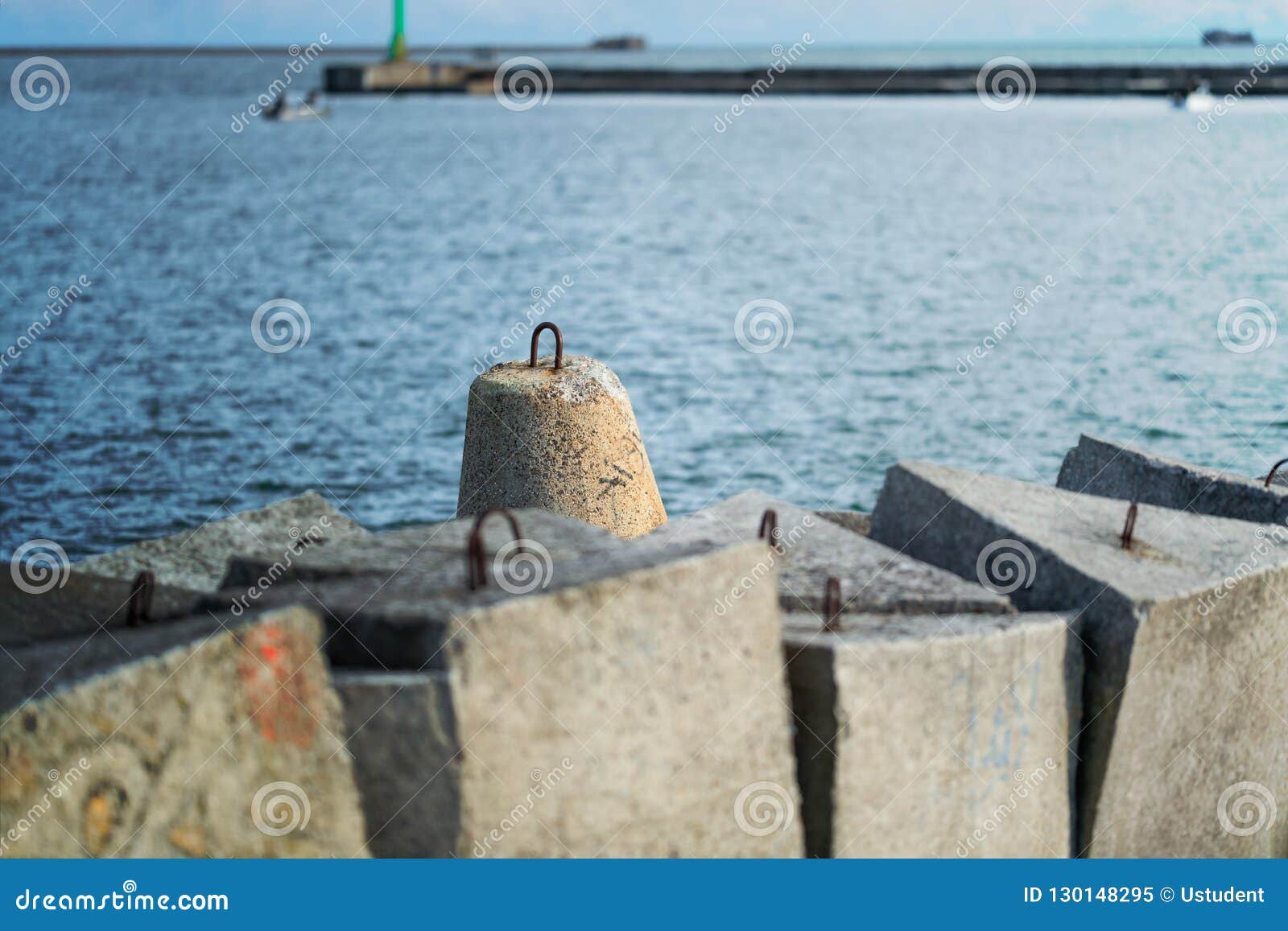 Large concrete breakwaters stock image. Image of ocean - 130148295