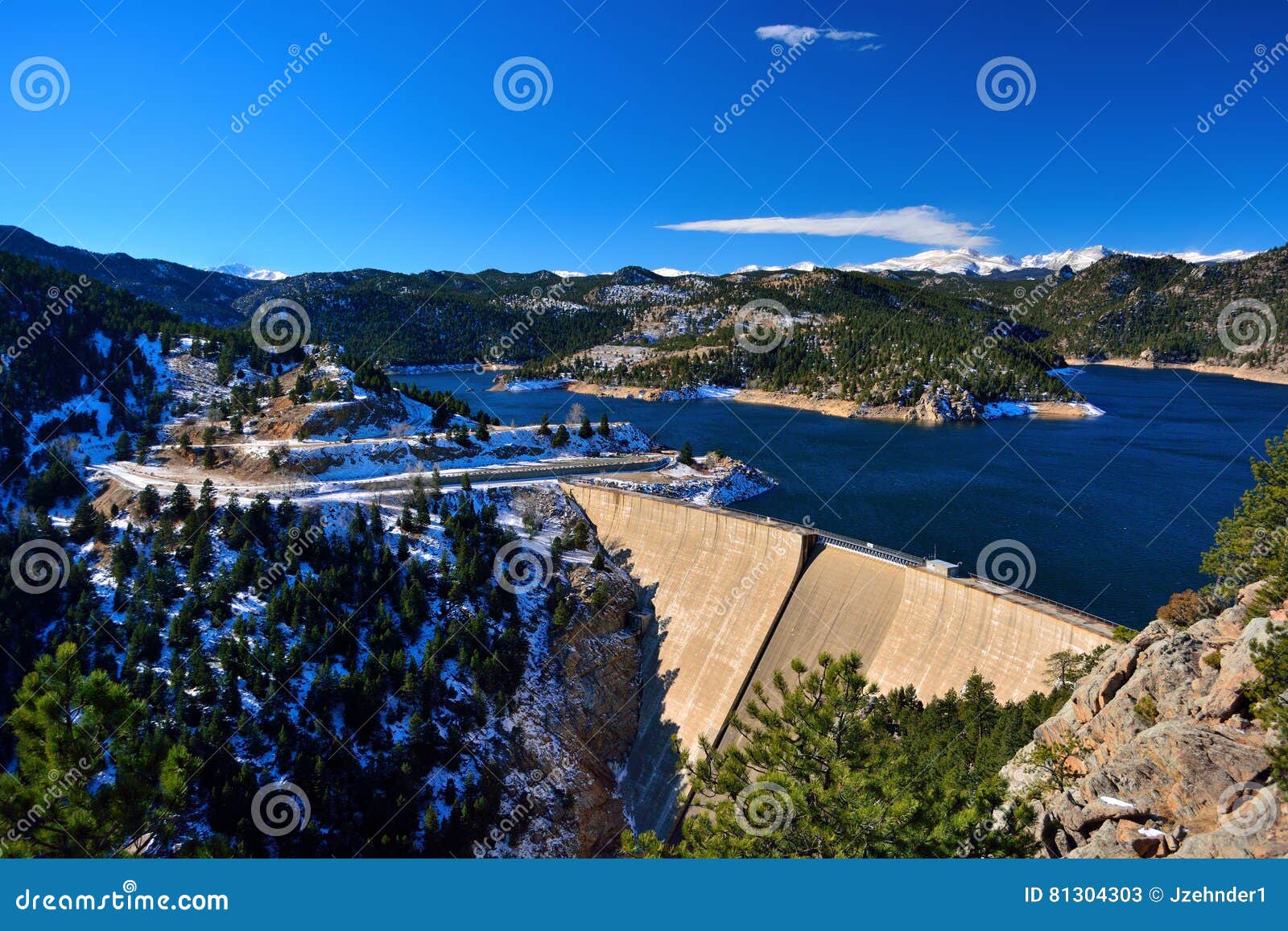 Large Concrete Dam and Reservoir with Snow in the Mountains Stock Image ...