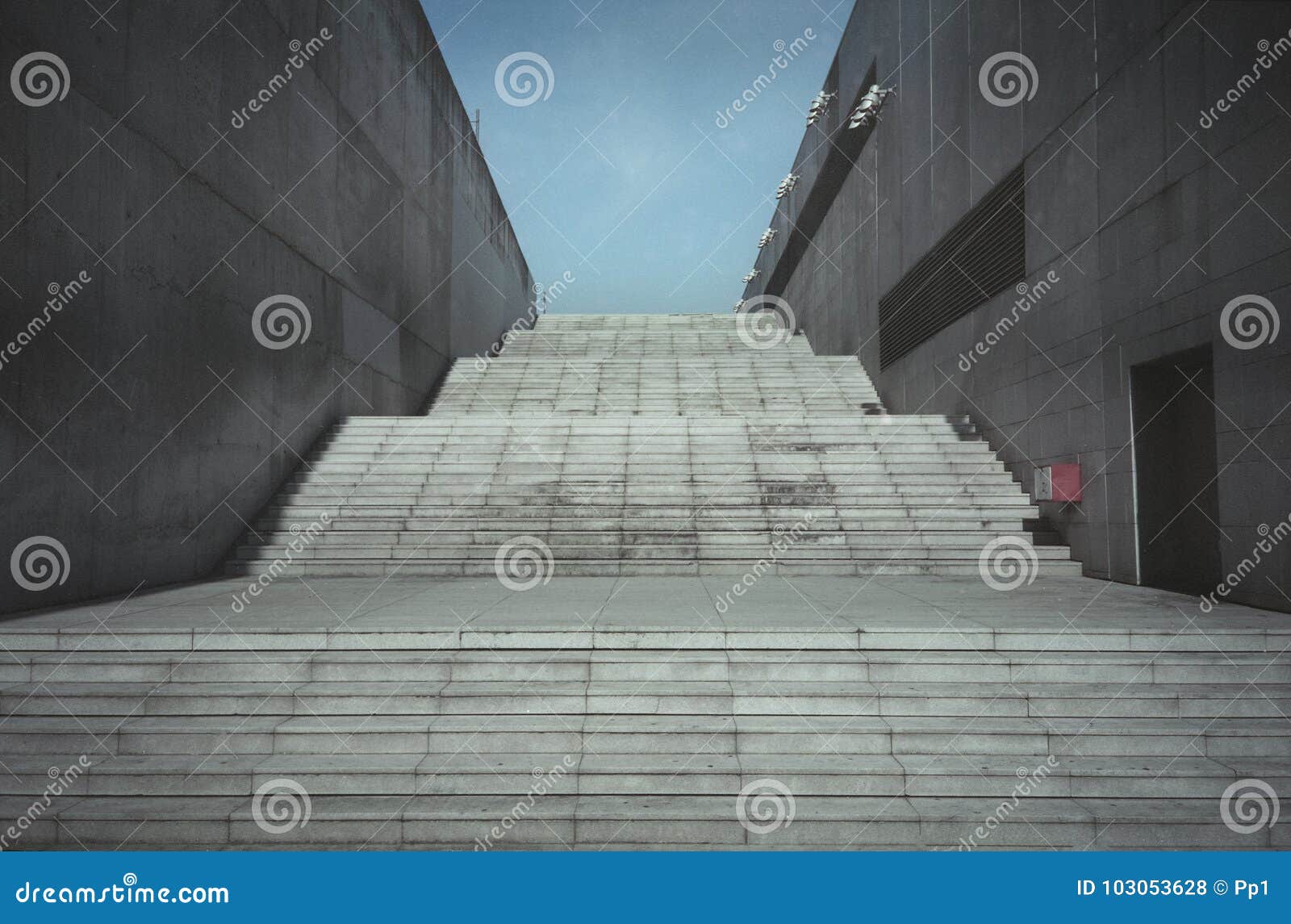 On Large Concrete White Column Are Triangular Knitted Shawls Royalty ...