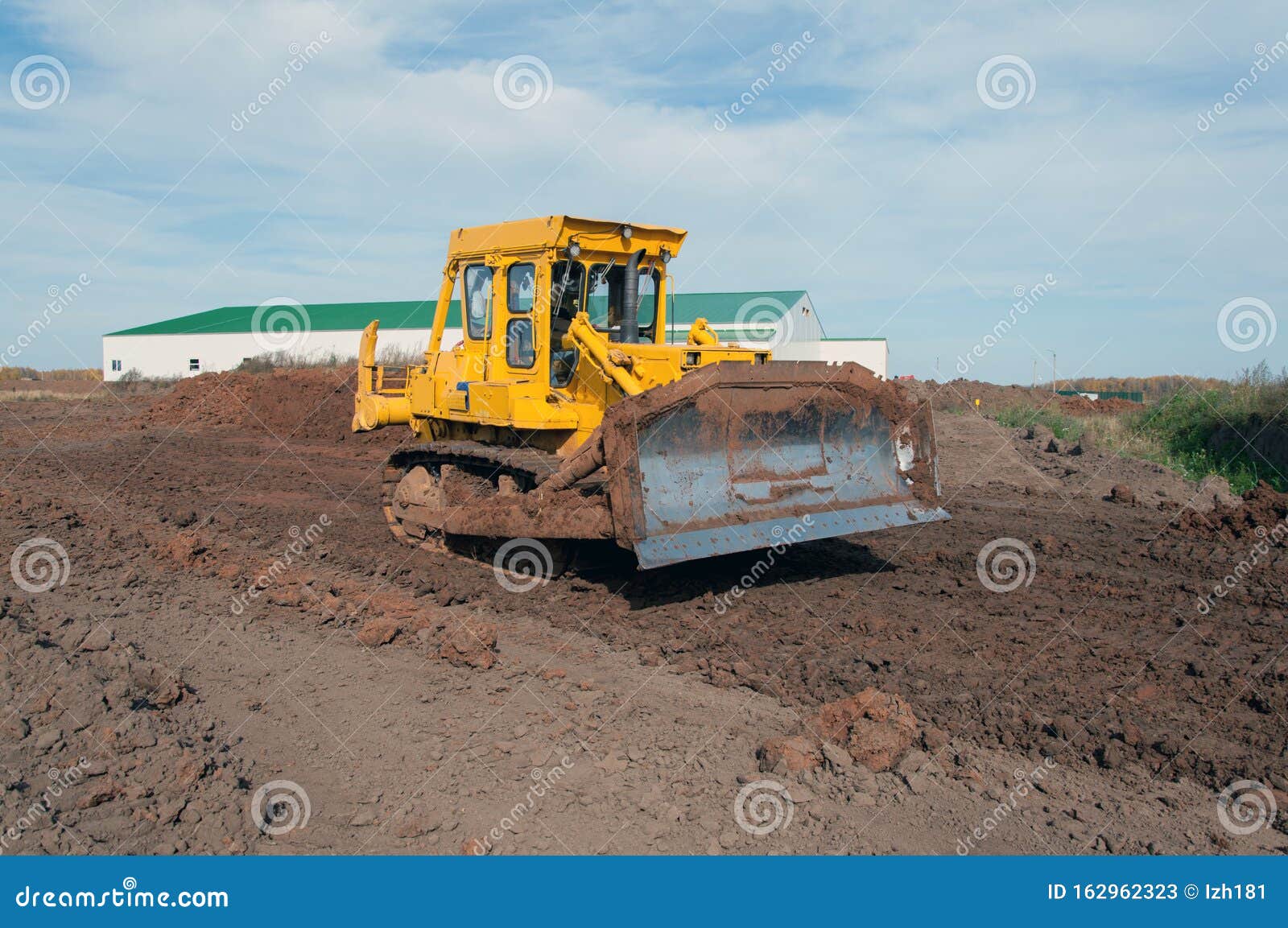 Large Construction Bulldozer at a Construction Site Stock Image - Image ...