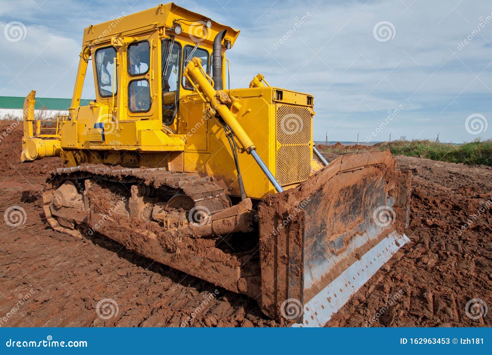 Large Construction Bulldozer at a Construction Site Stock Image - Image ...