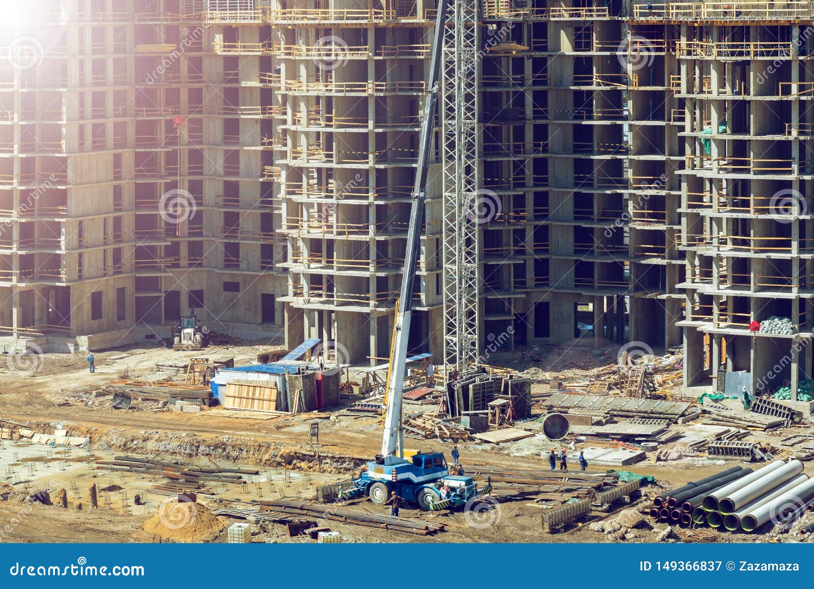 Large Construction Site Including Several Cranes Working on a Building ...