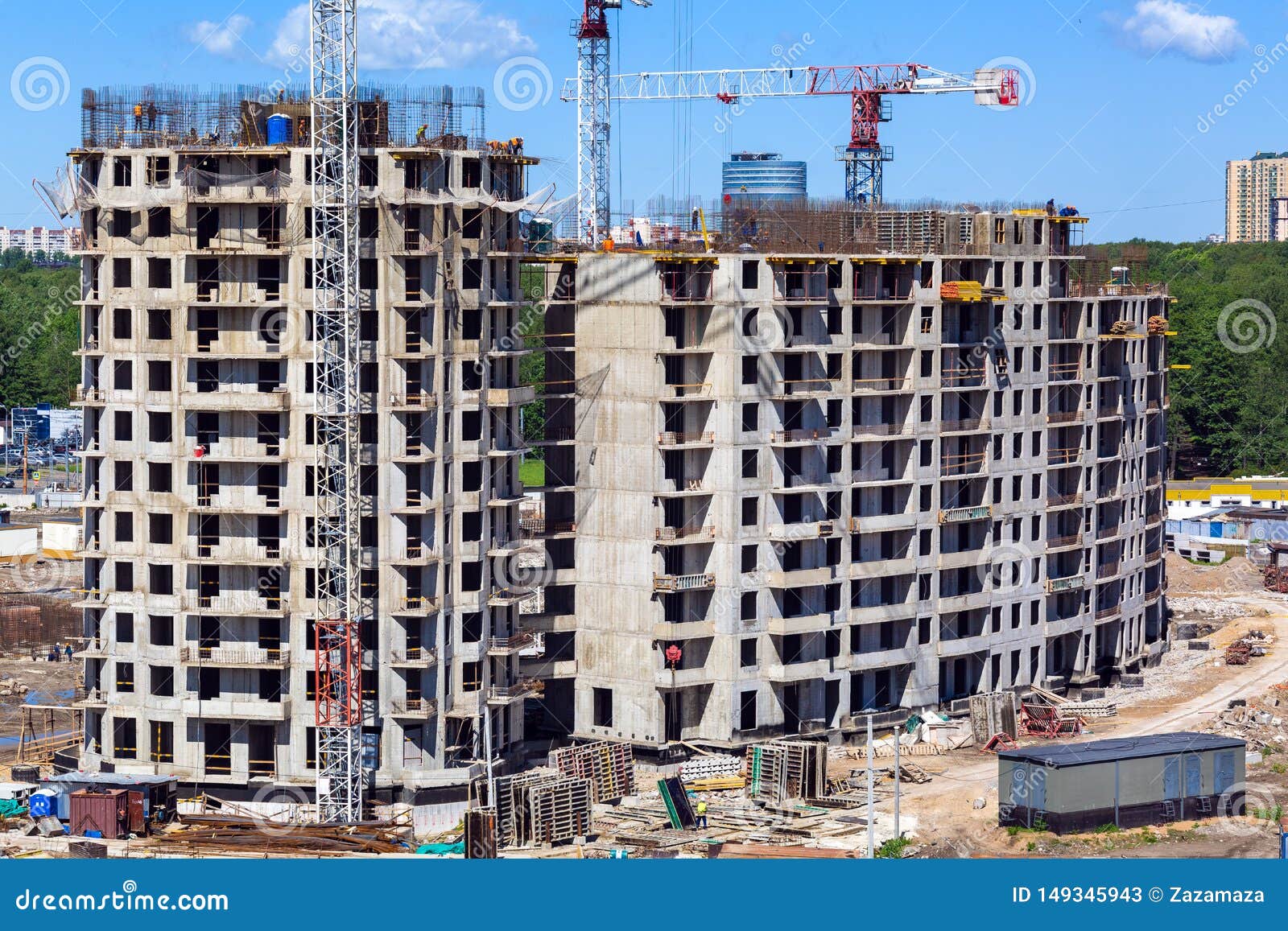 Large Construction Site Including Several Cranes Working on a Building ...