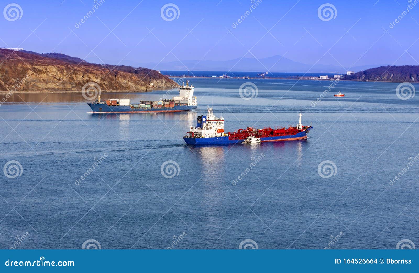 Large Container Ship and Reefer Ship at Blue Sea Stock Photo - Image of ...