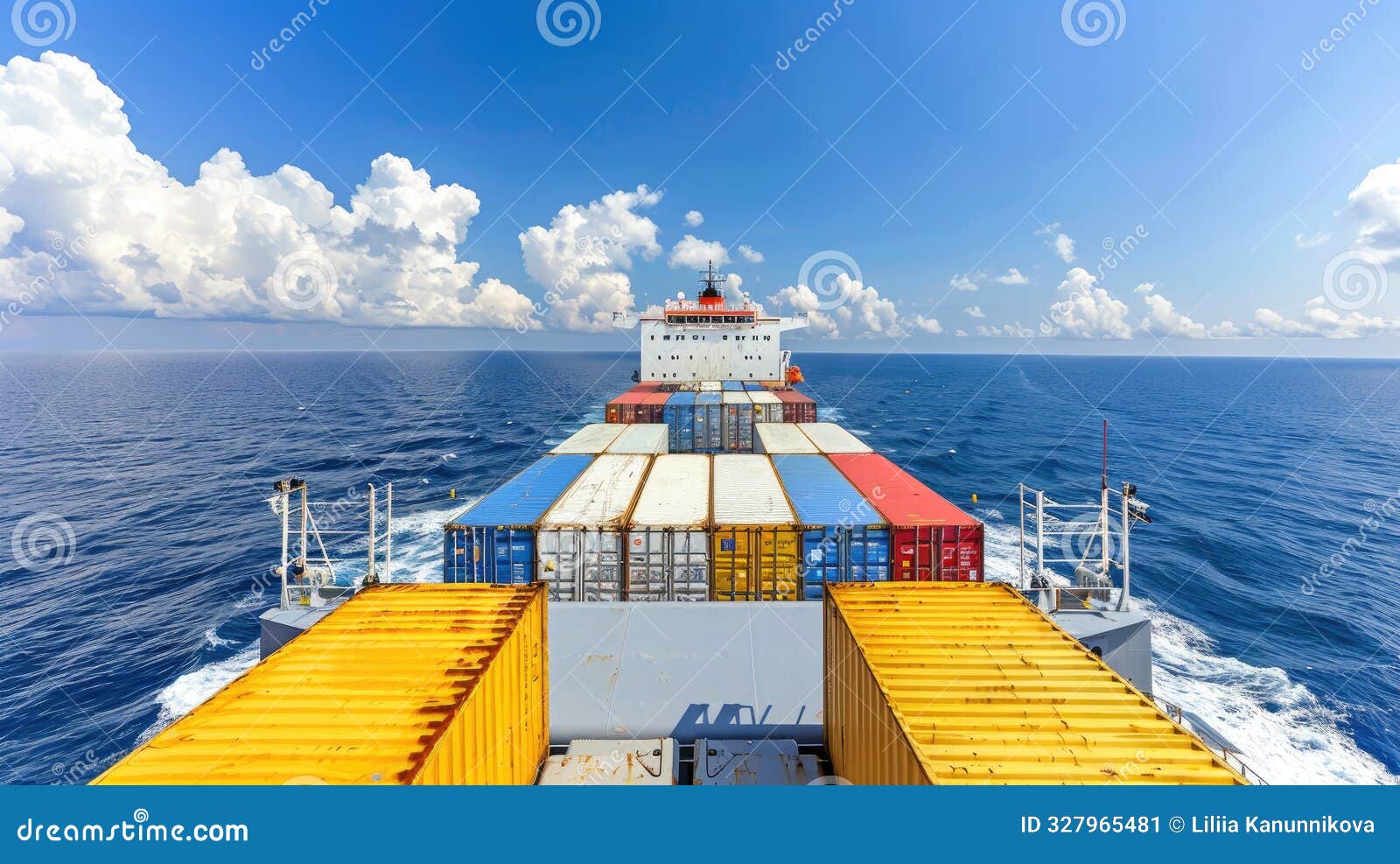 A Large Container Ship Sails through the Ocean with Stacks of Colorful ...