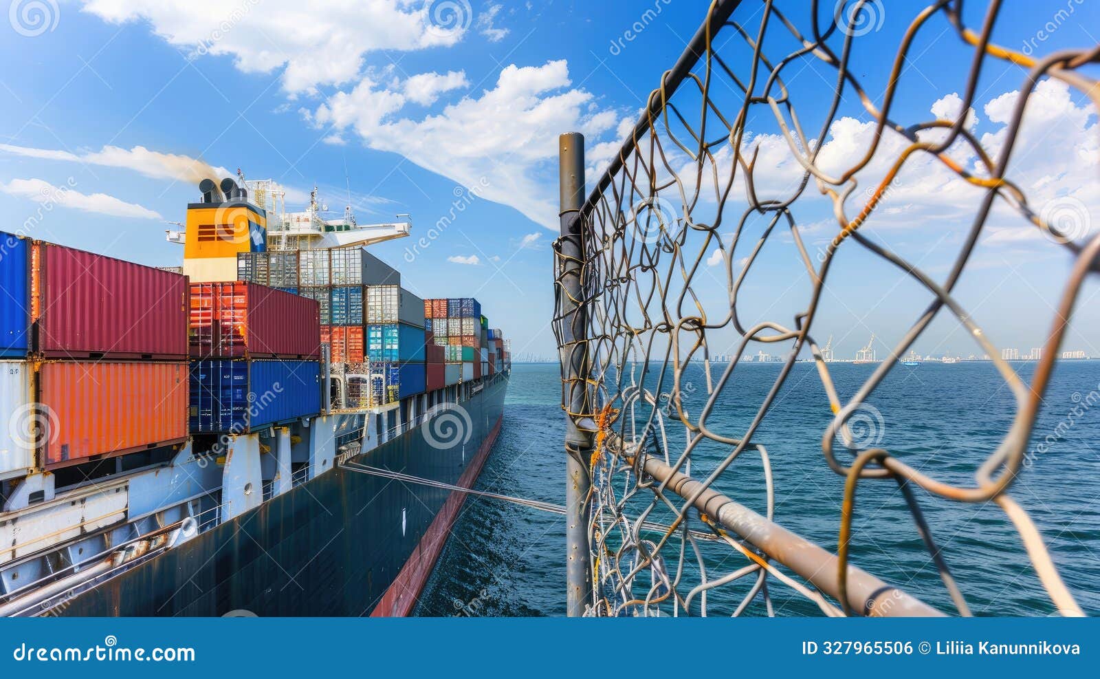 A Large Container Ship Sails through the Ocean with Stacks of Colorful ...