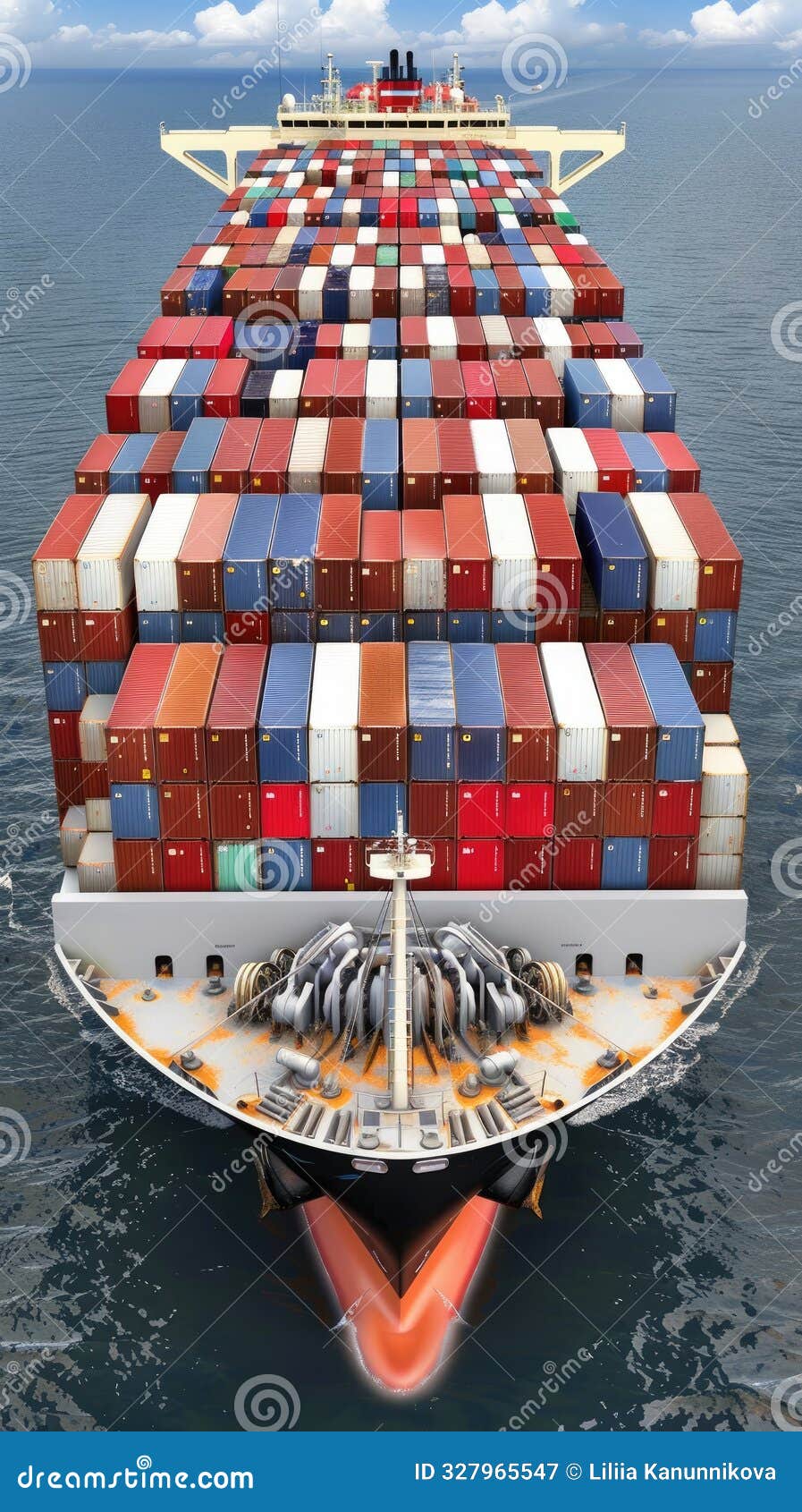 A Large Container Ship Sails through the Ocean with Stacks of Colorful ...
