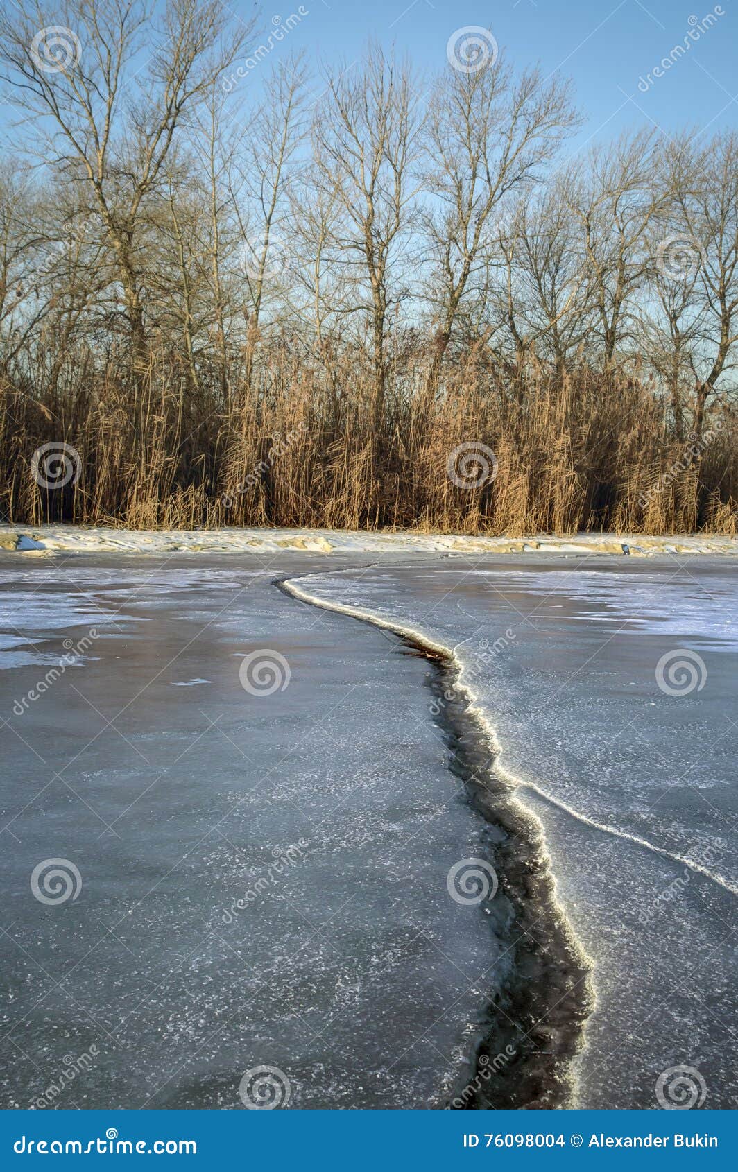 A large crack in the ice stock photo. Image of water - 76098004