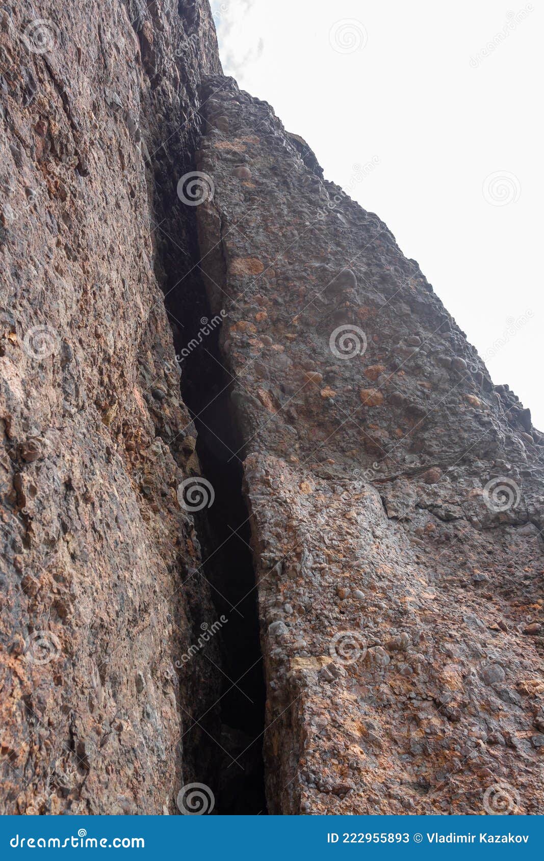 Large Crack in the Rock Consisting of Small Round Stones Held Together ...