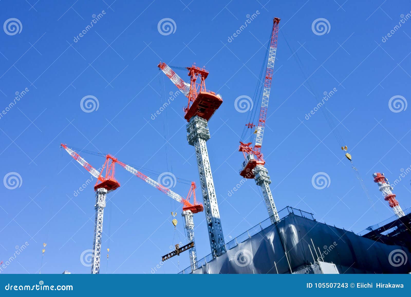 Large Crane of Multiple Buildings Stock Image - Image of cranes, blue ...