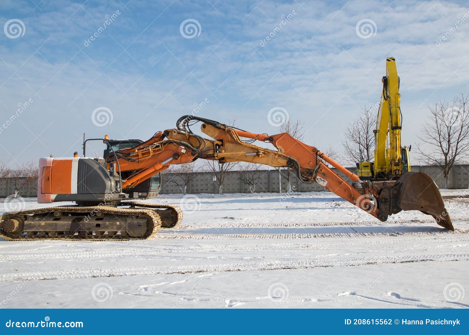 Large Crawler Excavators are Standing at a Construction Site Stock ...