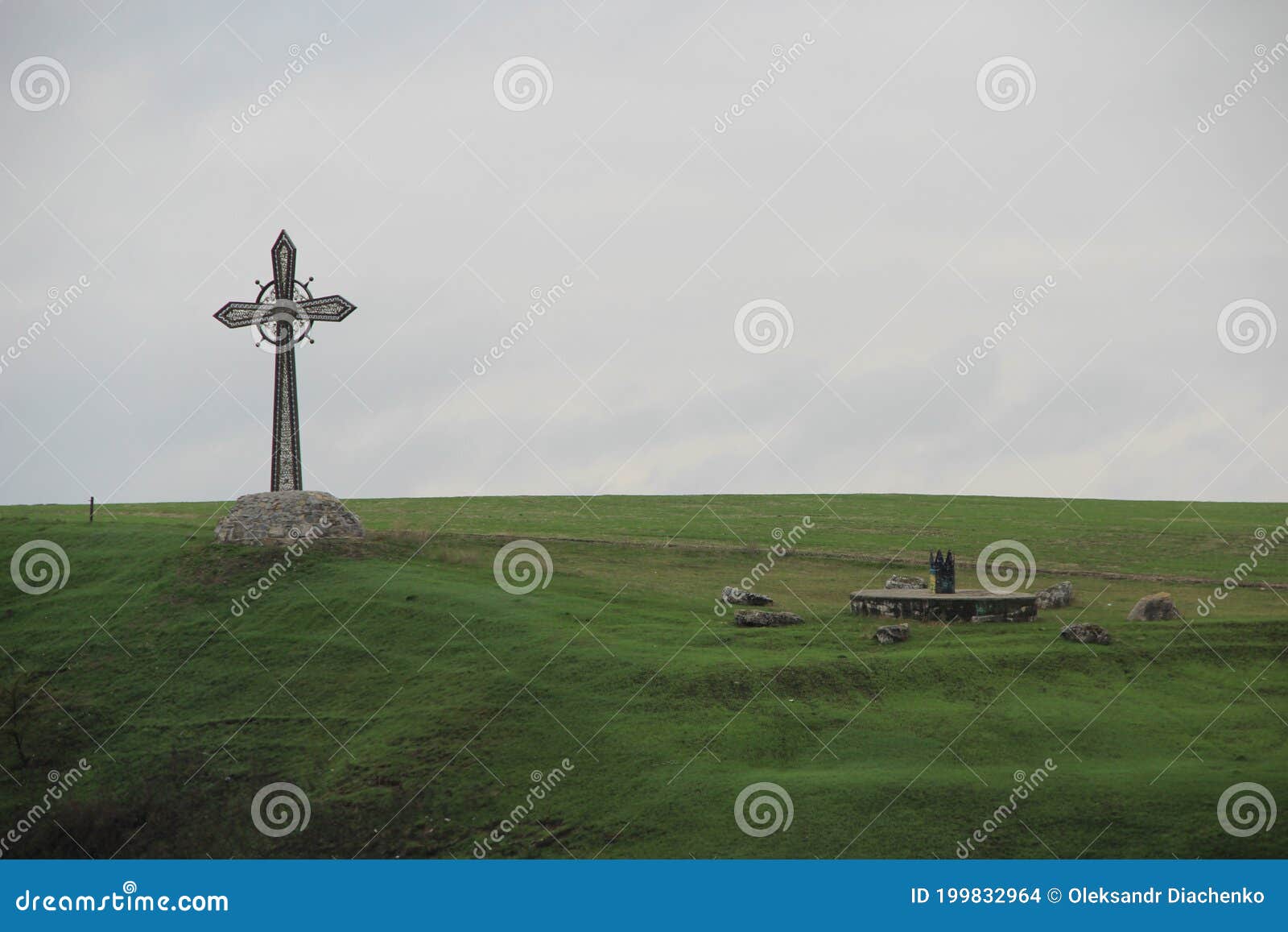 Large Cross in a Field with Green Grass Stock Photo - Image of ...