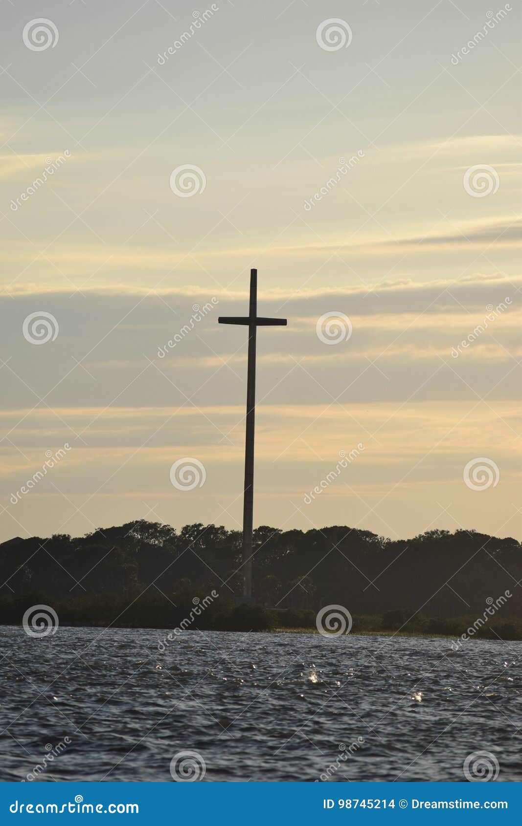 Large Cross by the River stock photo. Image of dusk, ocean - 98745214