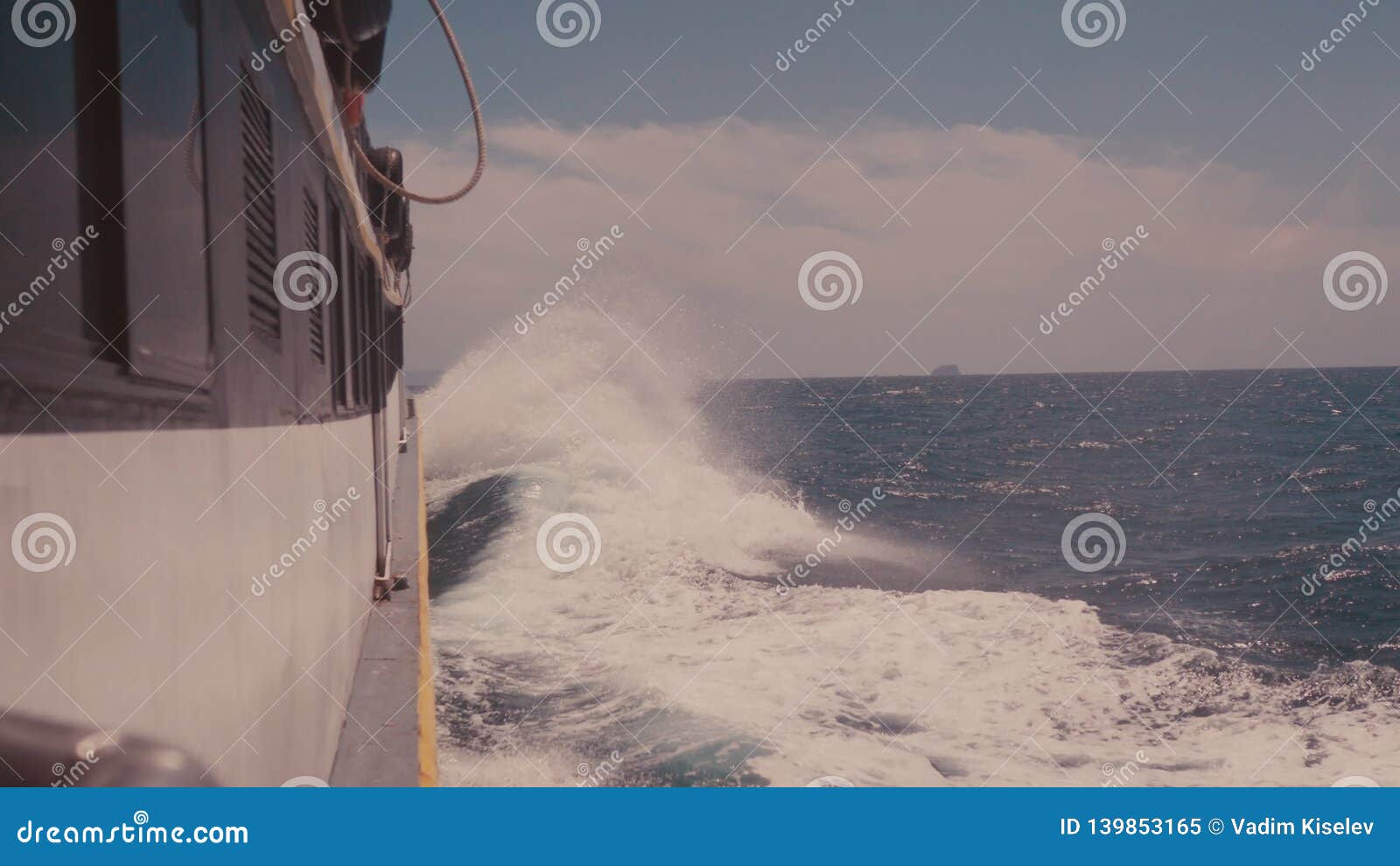 Large Cruise Ship at Open Sea. Waves Splashing on the Side of Ship. in ...
