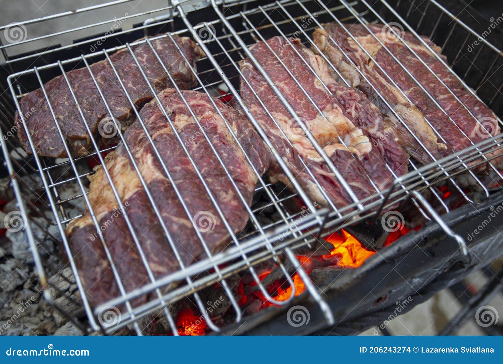 Large Cuts of Beef Meat on the Grill Rack Stock Photo - Image of fire ...
