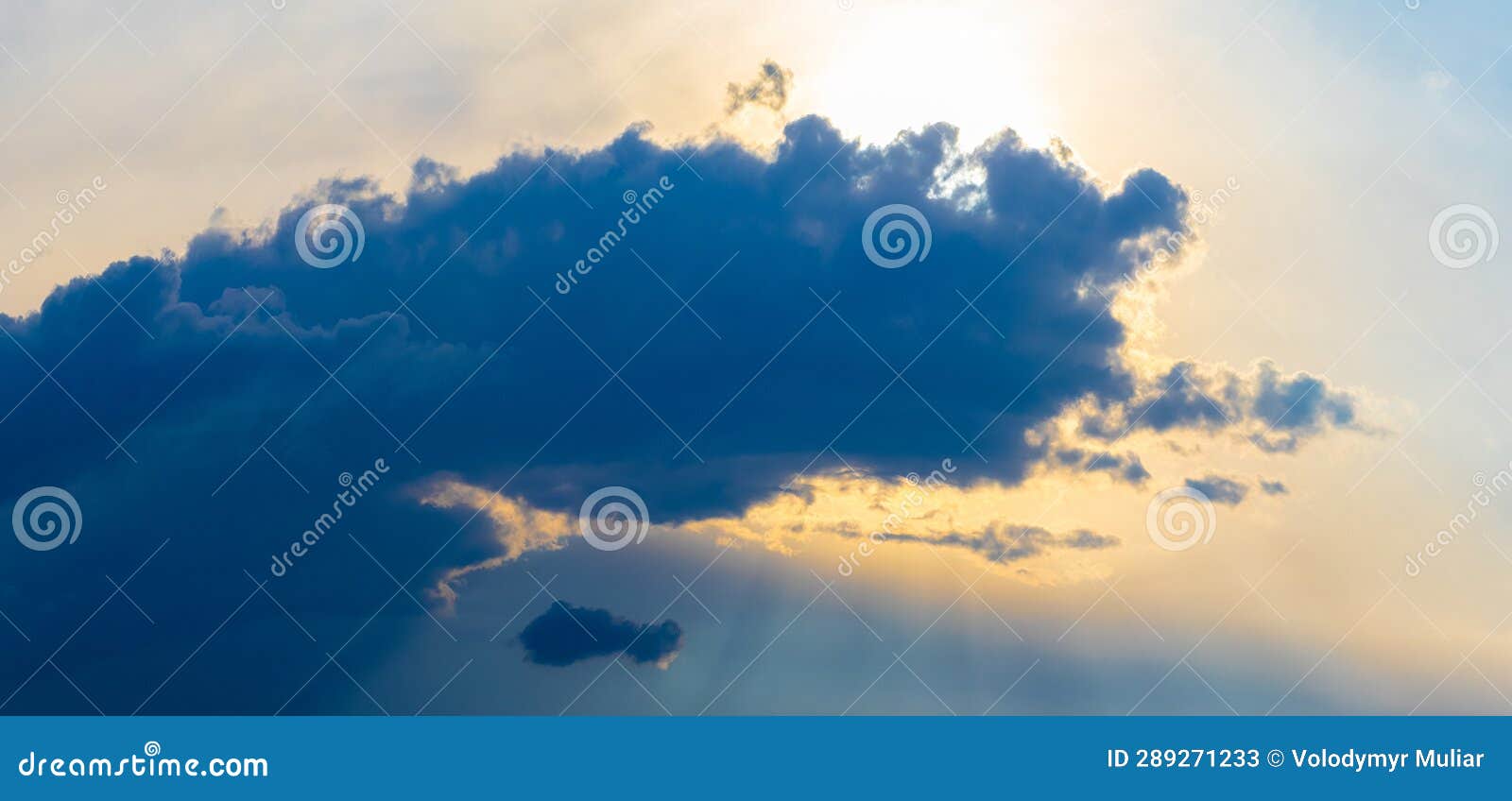 A Large Dark Blue Cloud in the Sky at Sunset Stock Image - Image of ...