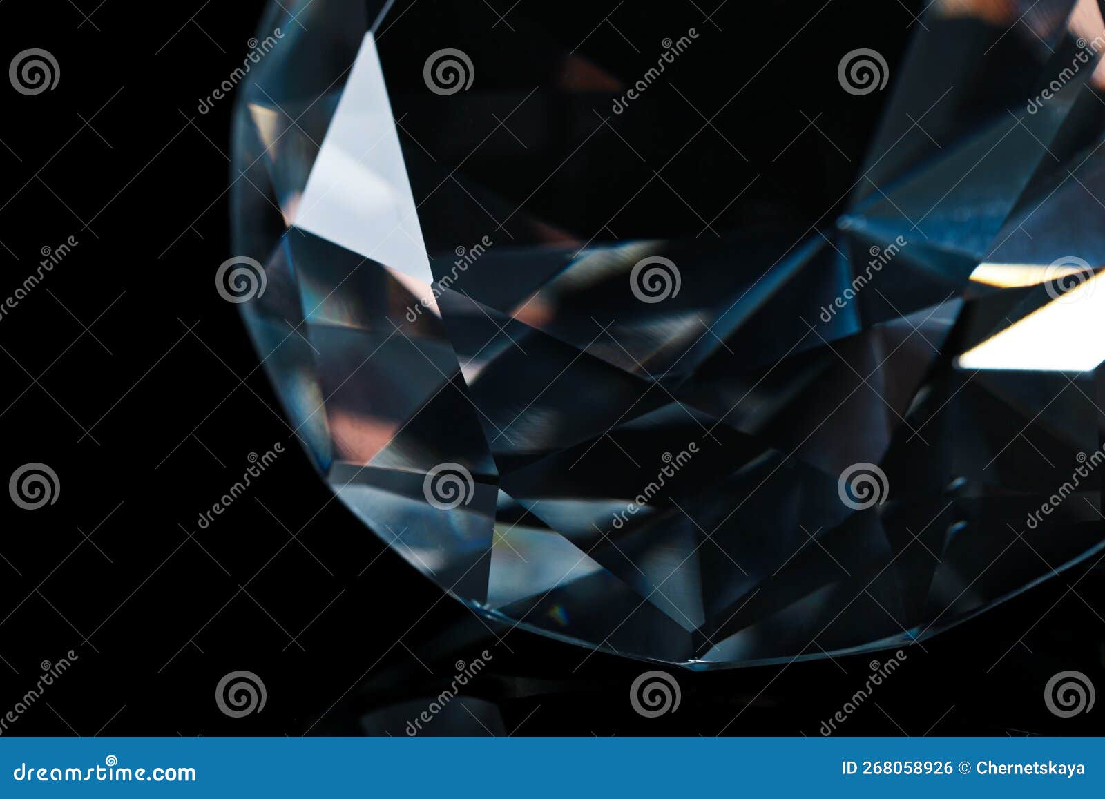 Large Dazzling Brilliant on Black Glass Surface, Closeup Stock Photo ...