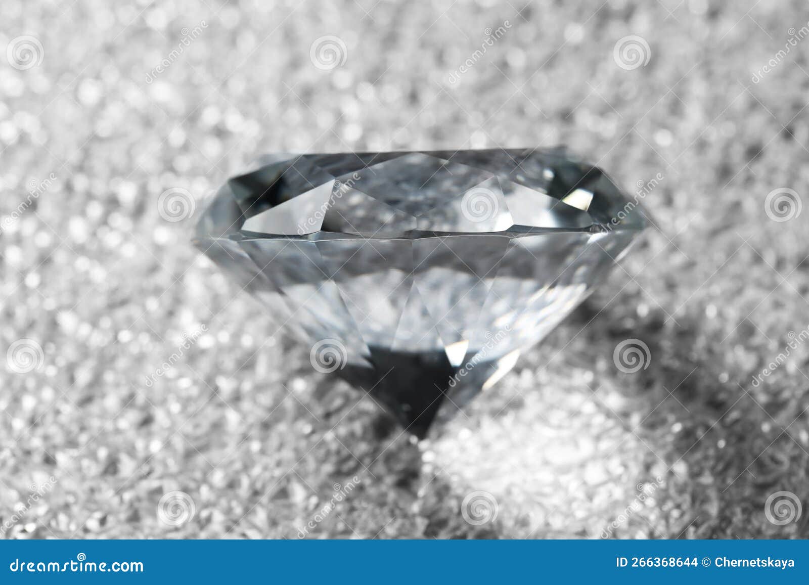 Large Dazzling Brilliant on Shiny Silver Surface, Top View Stock Photo ...