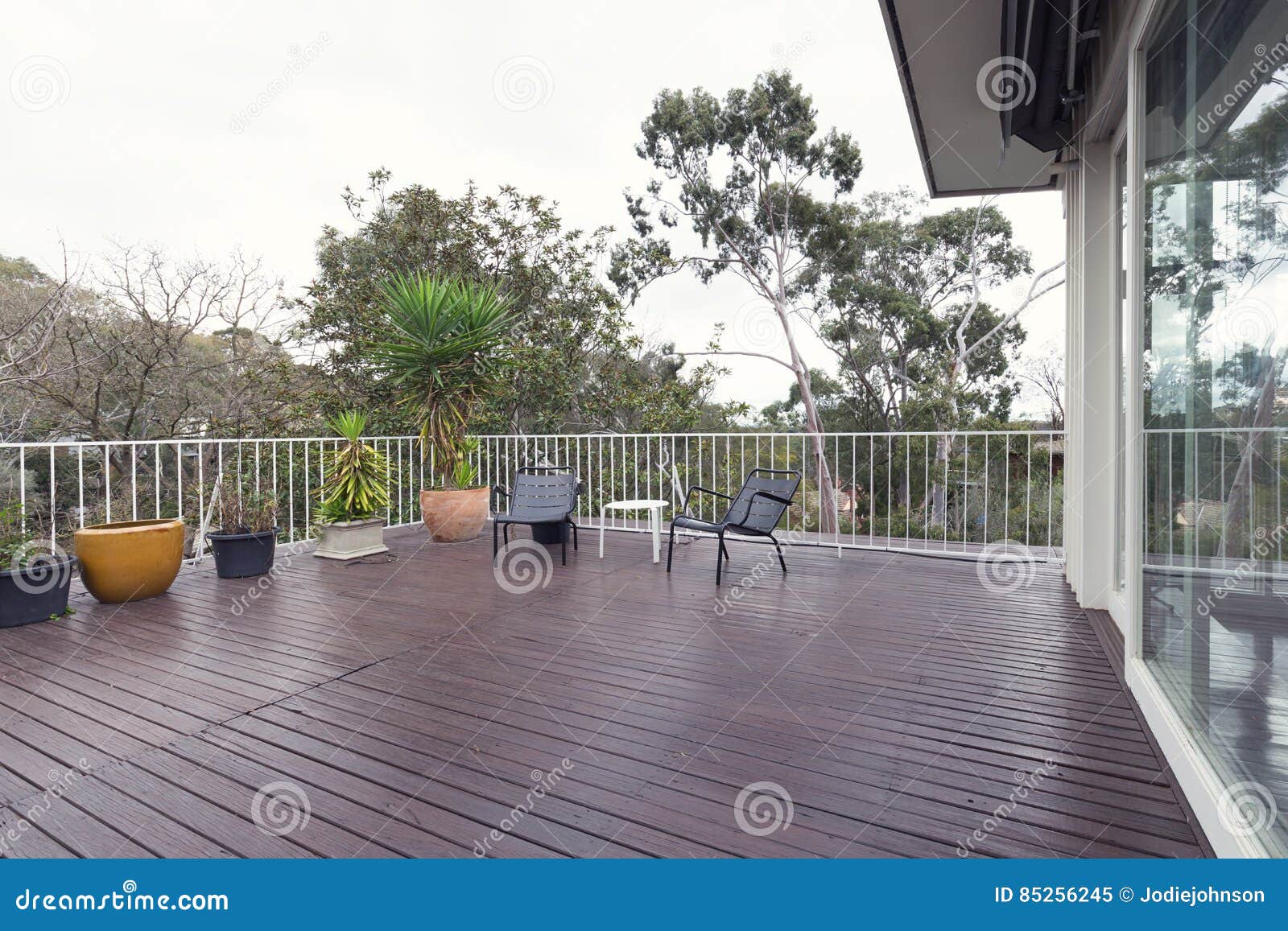 Large Deck Patio Terrace with a View of the Treetops Stock Image ...