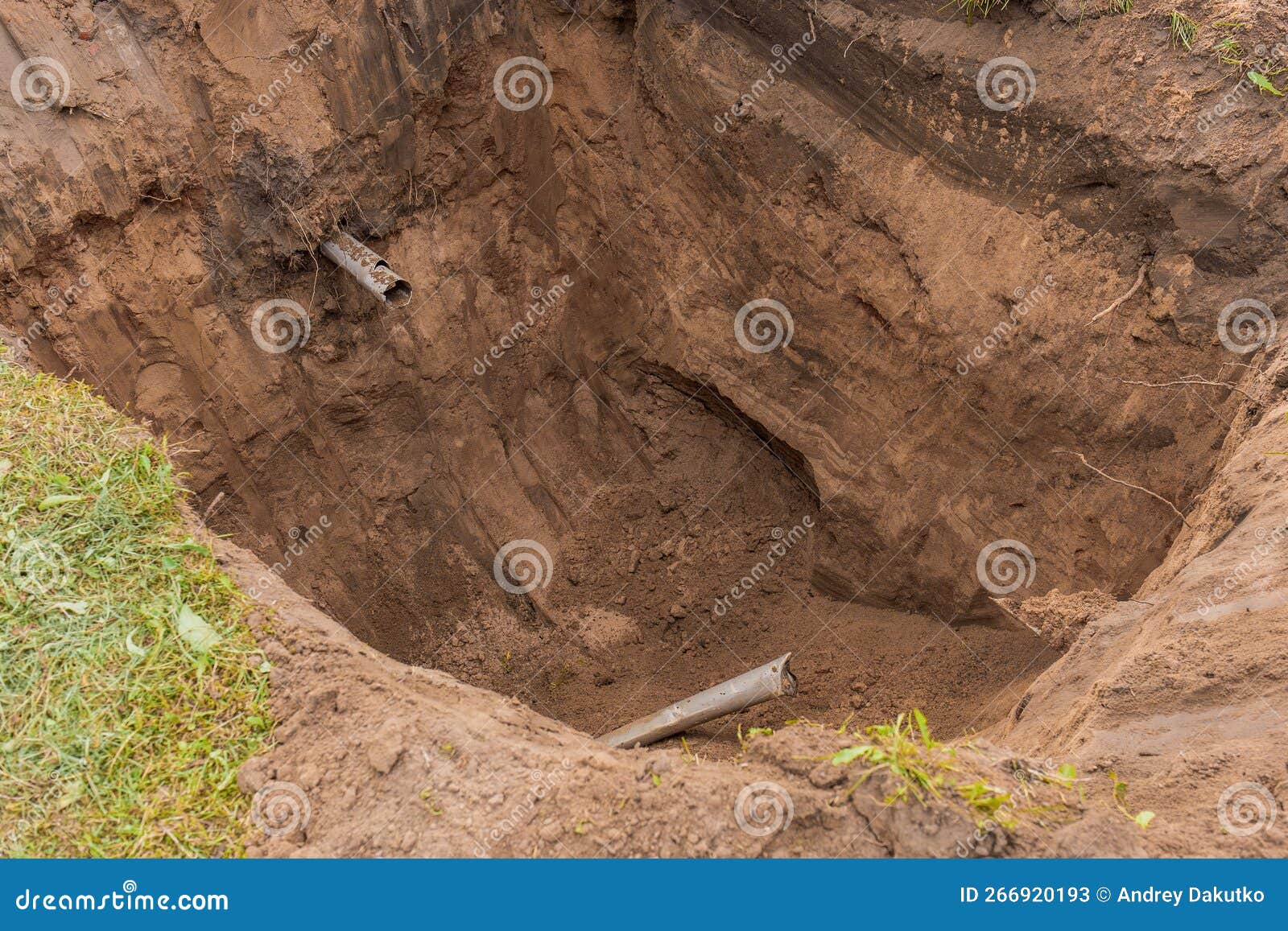 Large Deep Pit in the Ground after Digging an Excavator Sewer Pipe in ... Large Deep Pit in the Ground after Digging an Excavator Sewer Pipe in ...