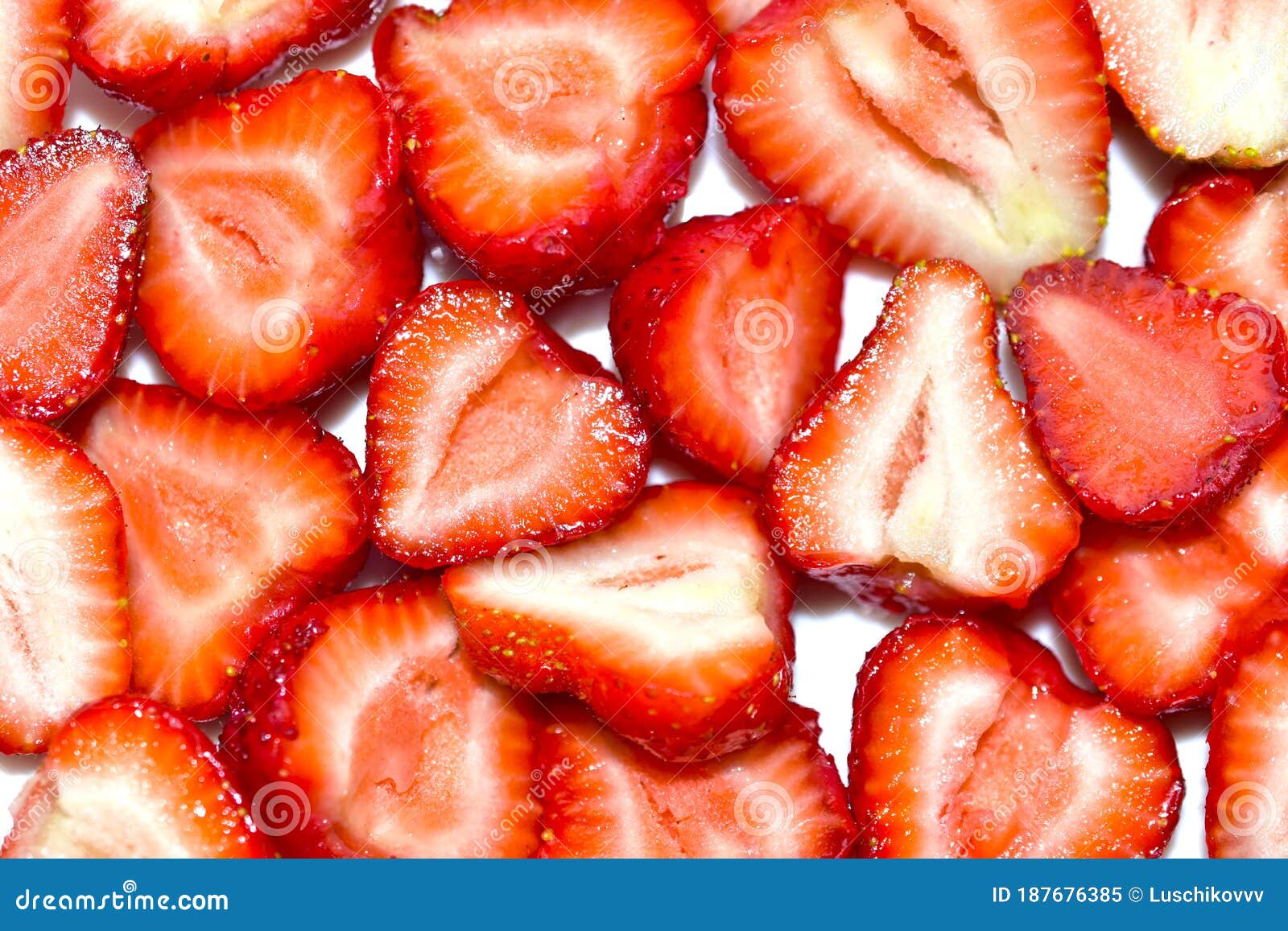 Large Delicious Victoria Berries and Sliced Victoria Berries on a White ...