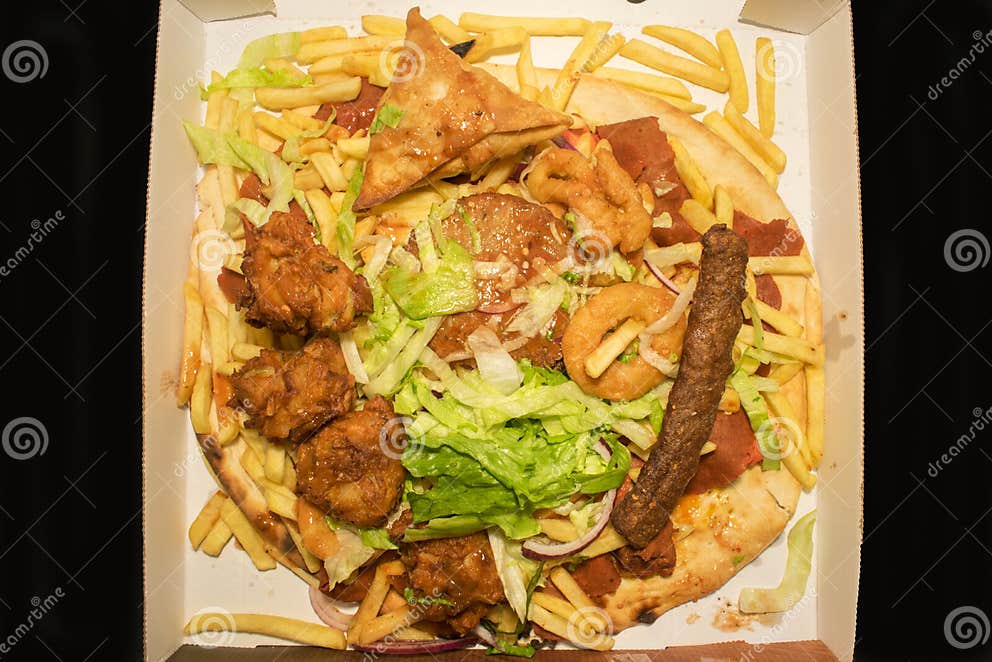 Large Donner Kebab on Naan Bread with Chips Stock Photo - Image of ...