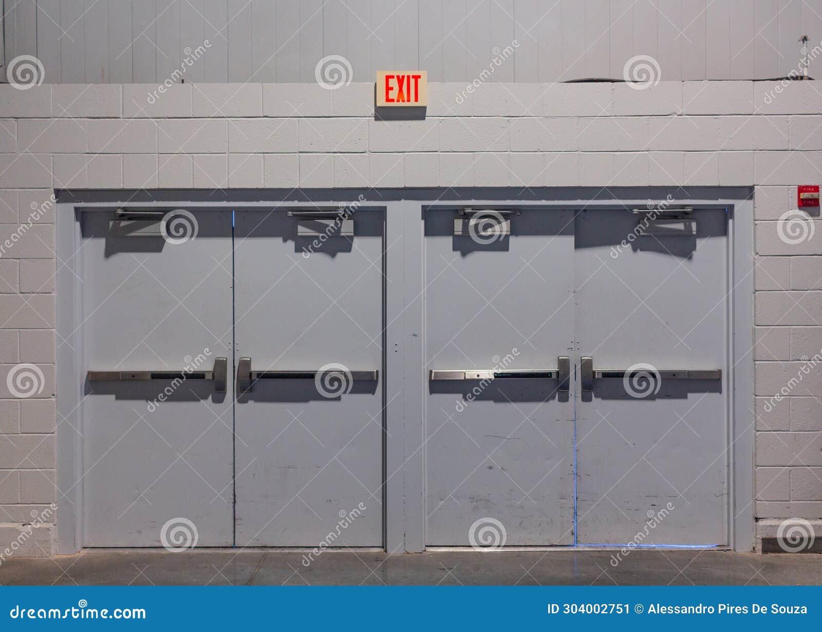 Large Doors with an Exit Red Sign for Emergency Evacuation or ...