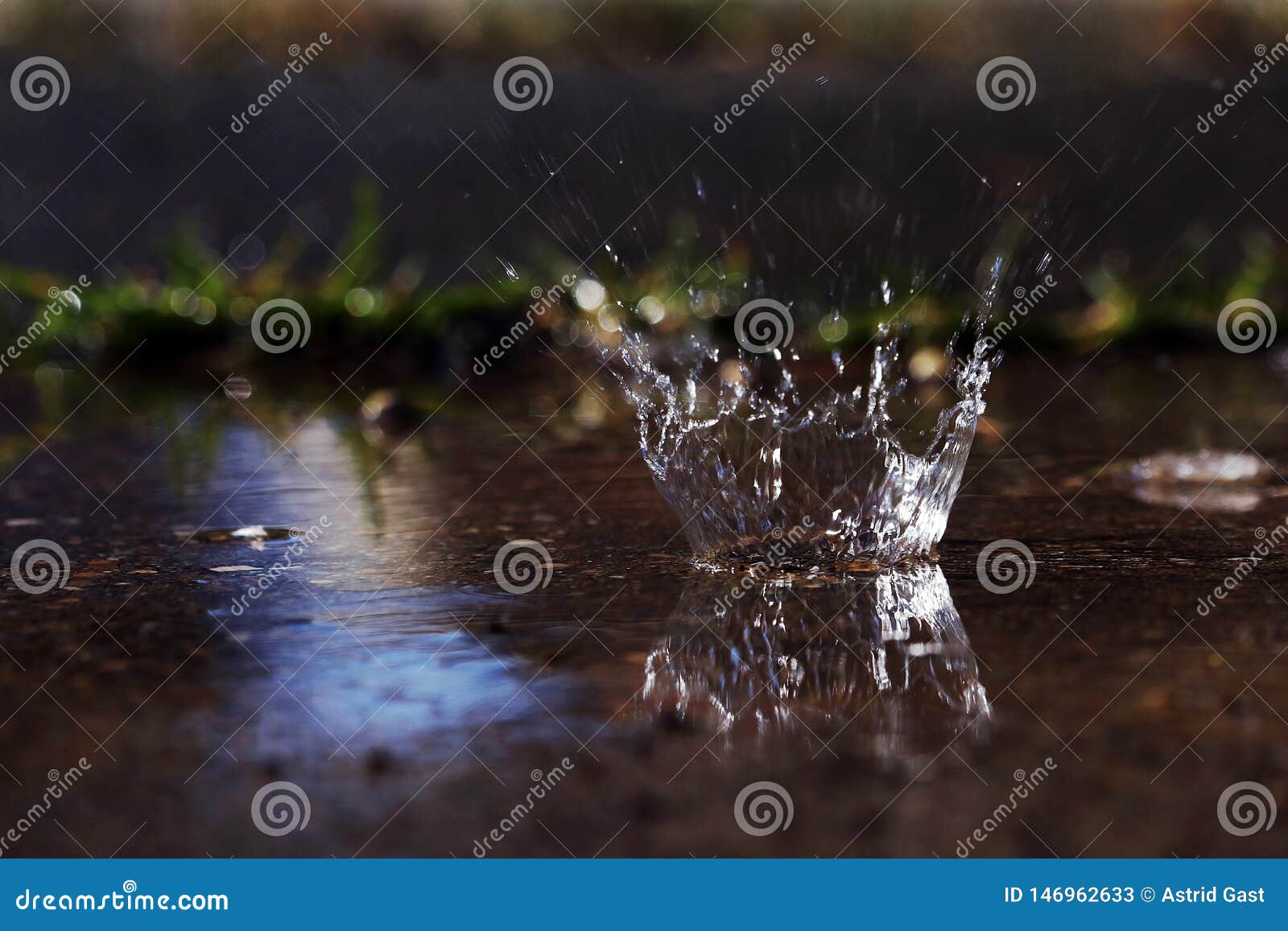 A Large Drop of Rain Hits the Ground Stock Image - Image of humid ...