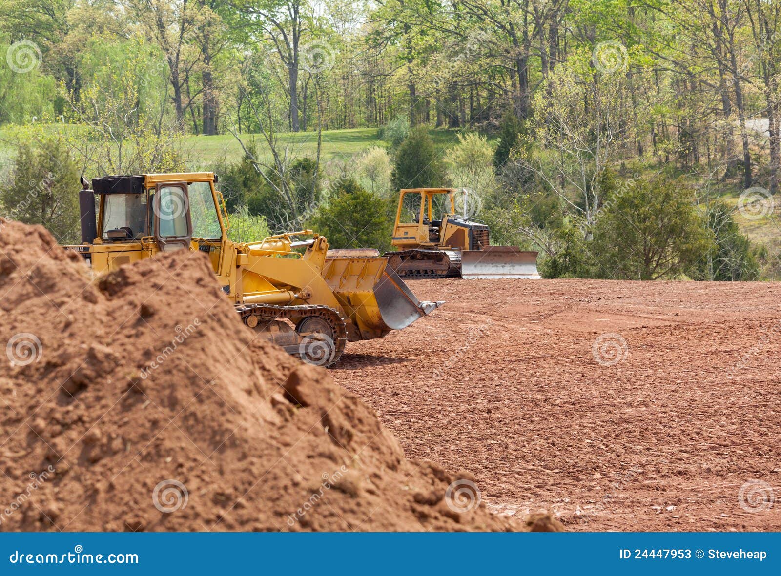 Large Earth Mover Digger Clearing Land Stock Image - Image of clearing ...