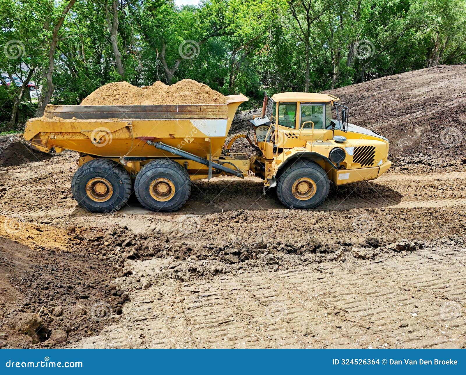 Large Earth Moving Dump Truck Loaded with Sand at a Construction Site ...