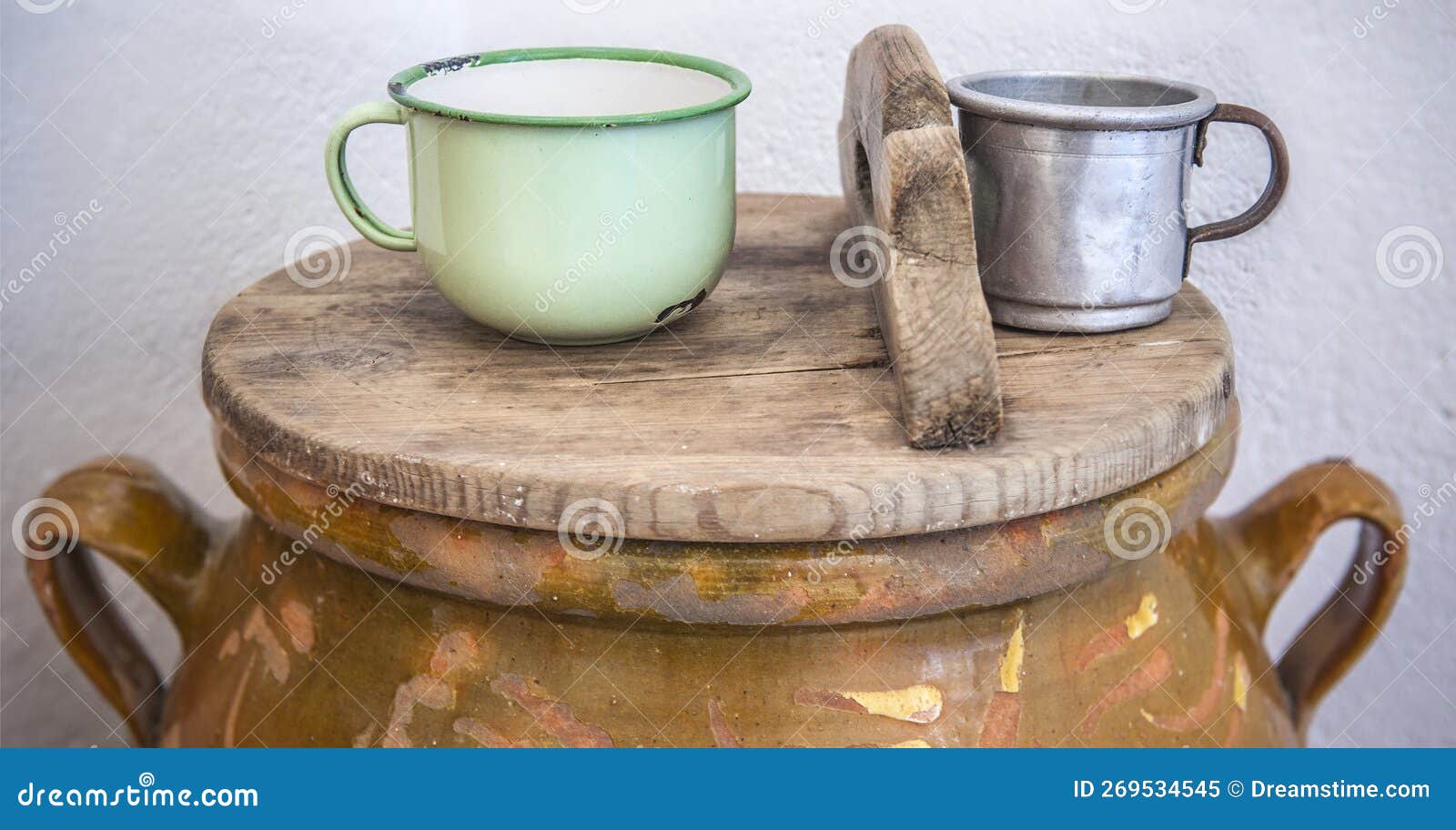 Large Earthenware Jar with Lid and Cups for Drinking Water Stock Image ...
