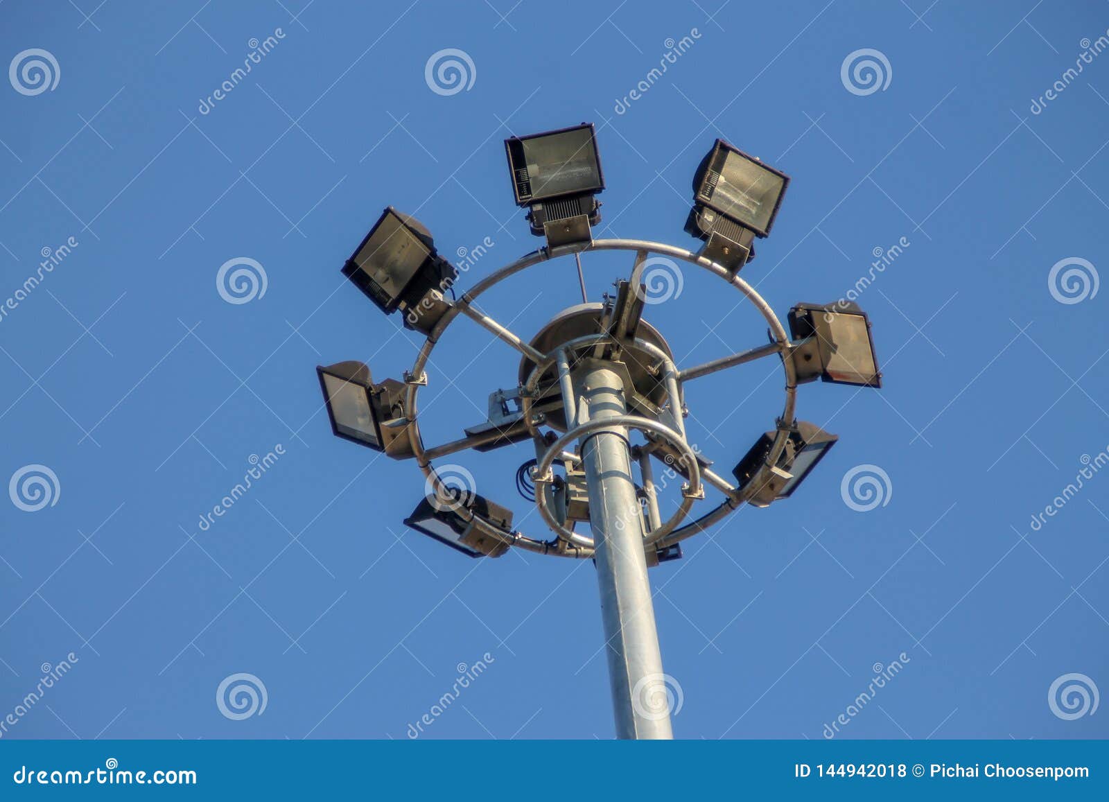 A Large Electric Pole Filled with Spotlights in the Blue Sky Stock ...