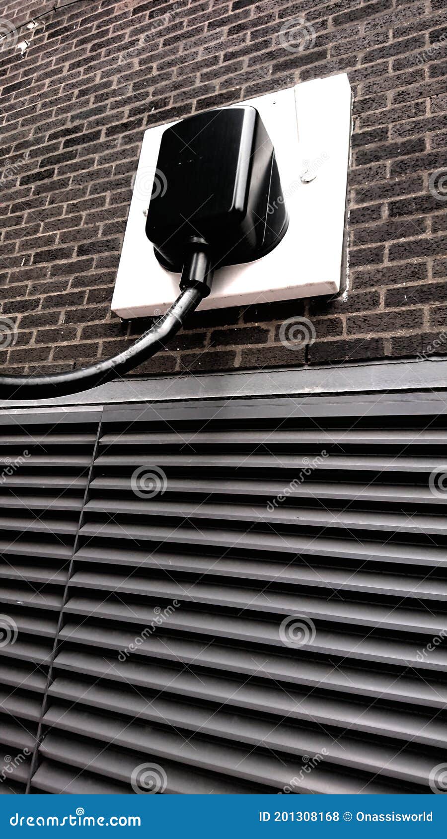 Large Electric Wall Socket and Plug on a Wall Stock Photo - Image of ...