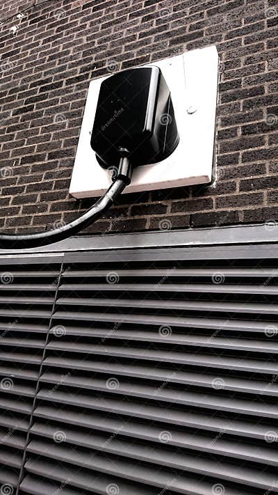 Large Electric Wall Socket and Plug on a Wall Stock Photo - Image of ...