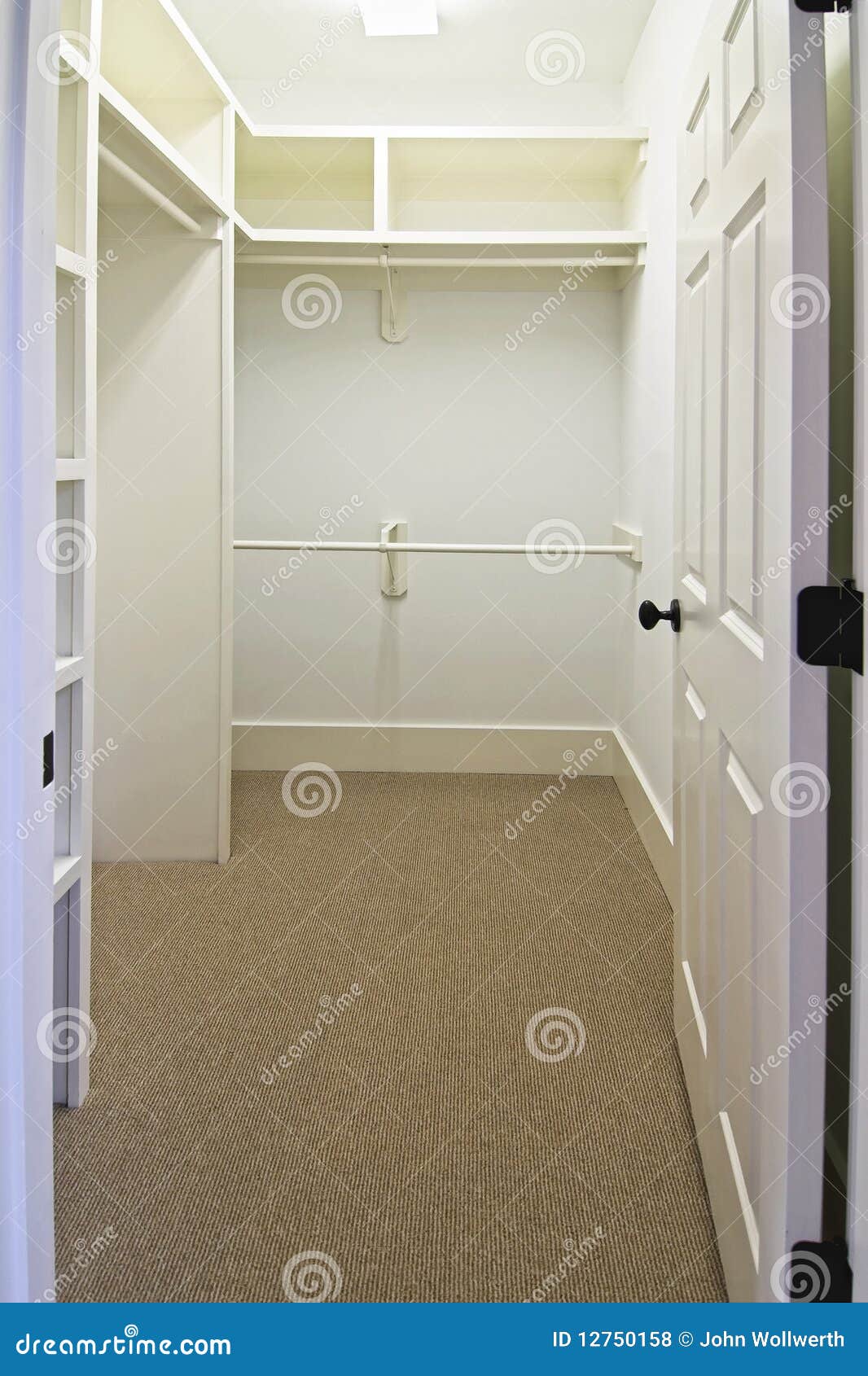Large empty walk in closet stock photo. Image of slider - 12750158