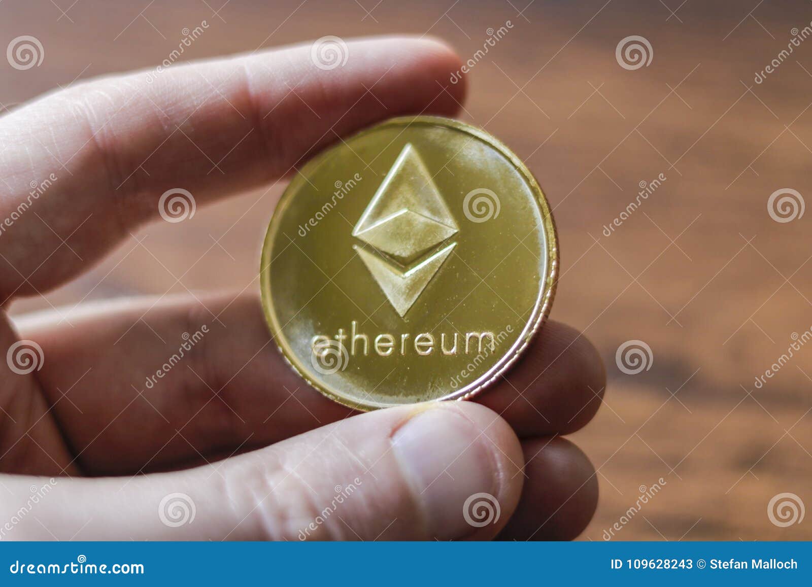 A Large Etherium Token in Hand Stock Image - Image of electronic, hodl ...