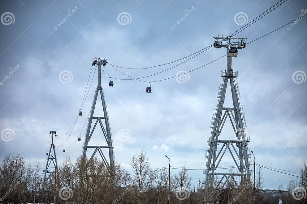 A Large Ferris Wheel is Being Pulled by a Cable Car System Stock Photo ...