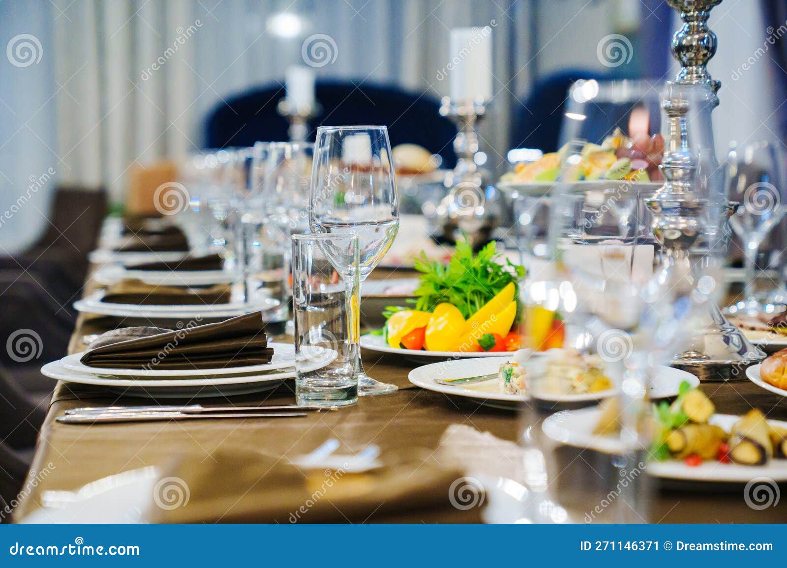 A Large Festive Table with Candles, Snacks and Tableware. Stock Image ...